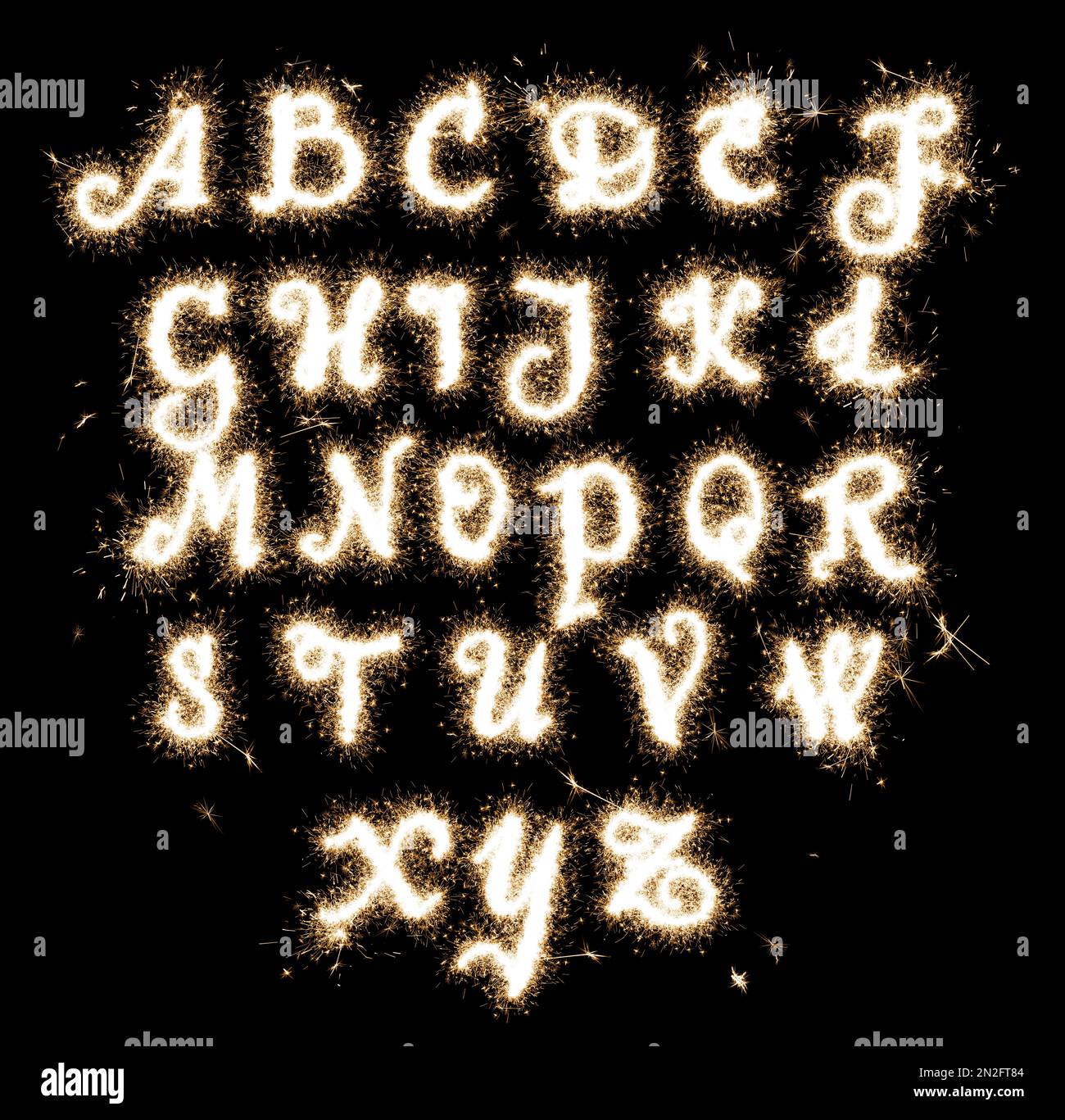 Set with letters made of sparkler on black background Stock Photo - Alamy