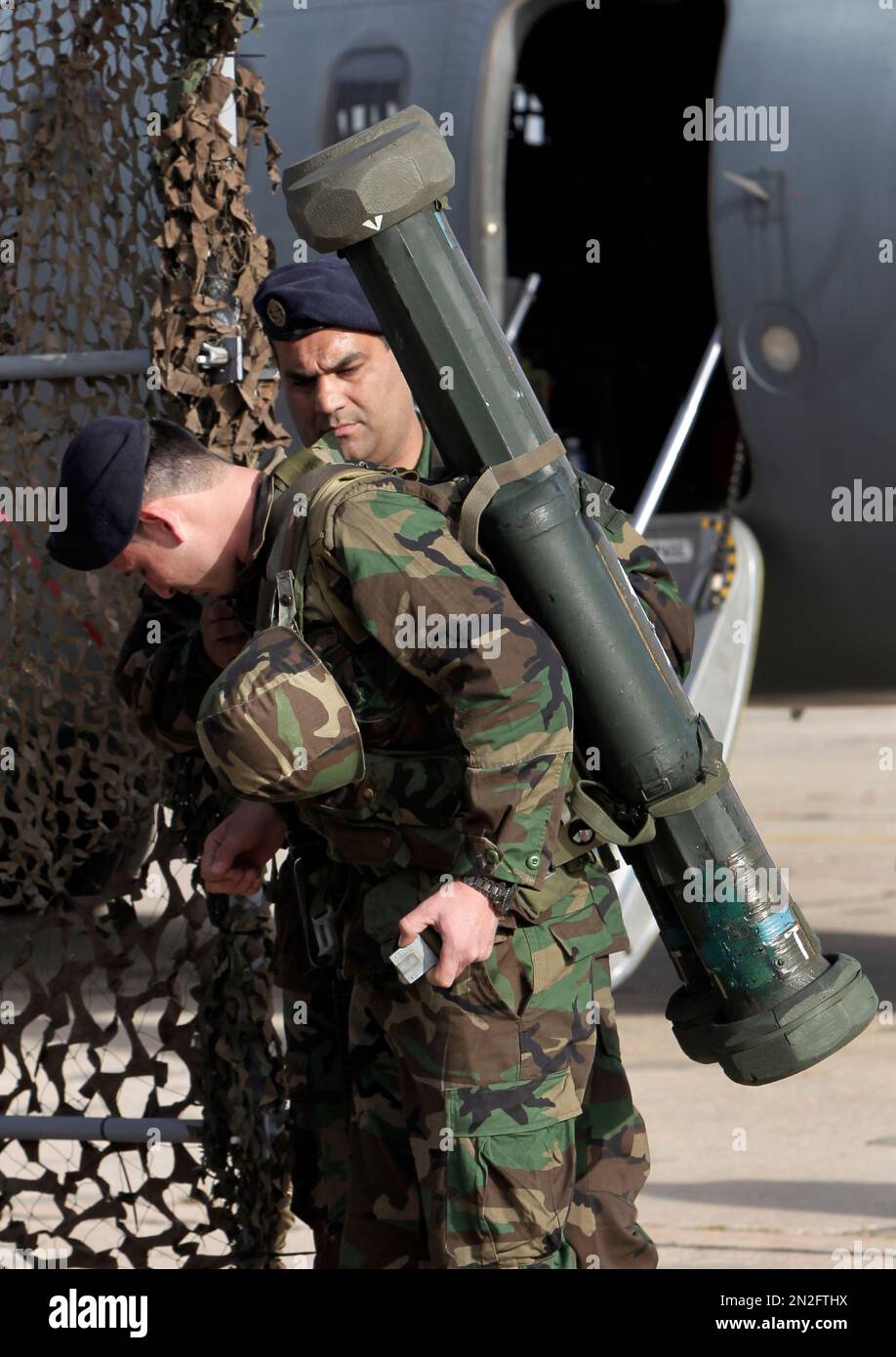 Lebanese army soldiers inspect French weapons at the Rafik Hariri ...