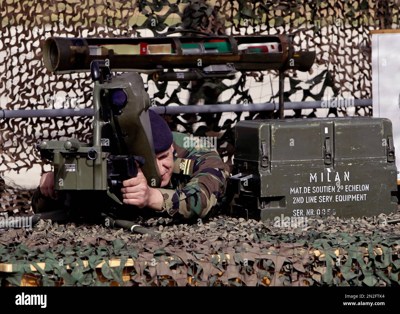 A Lebanese army officer inspects French weapons at the Rafik Hariri ...