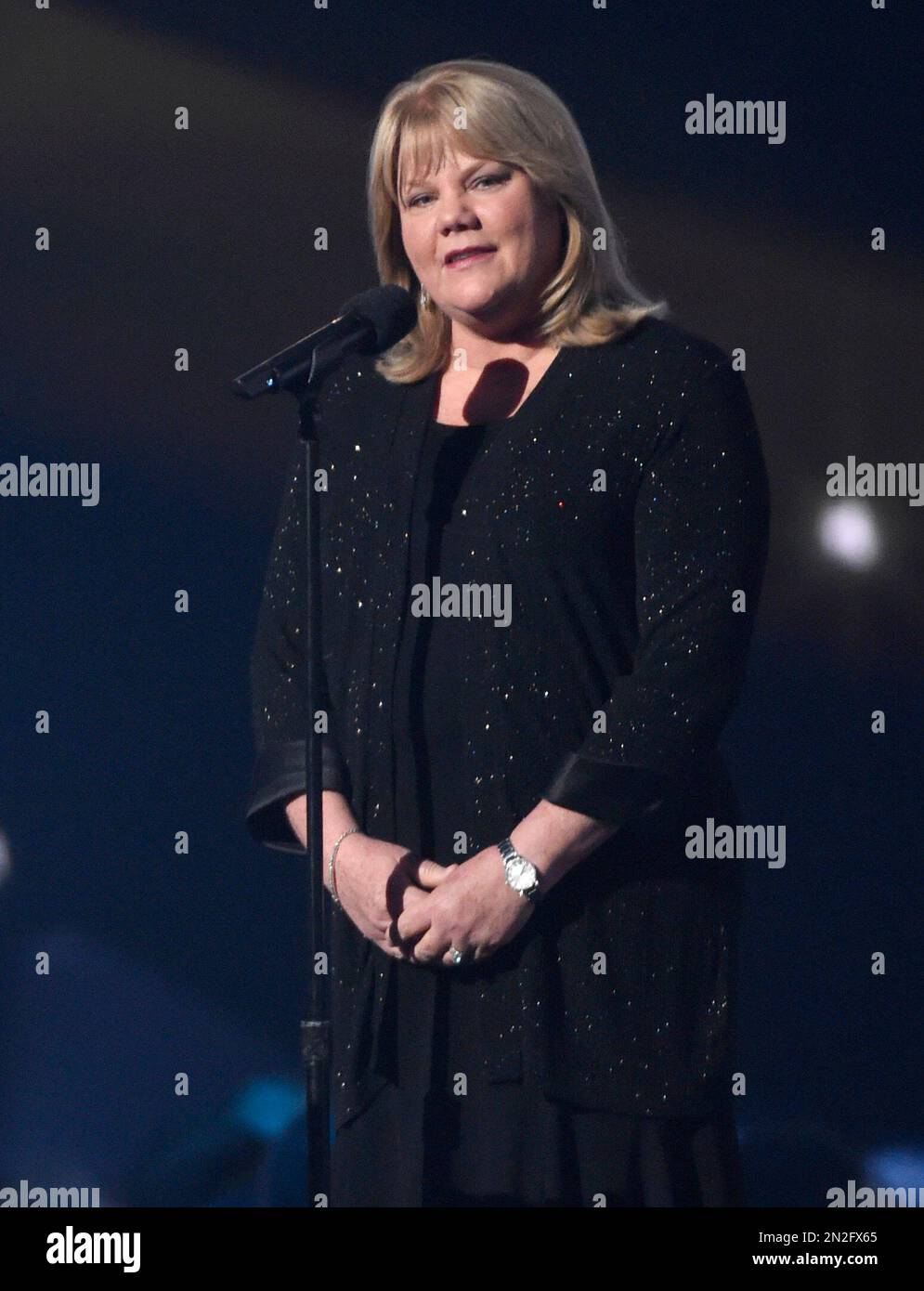 Andrea Finlay presents the milestone award to her daughter Taylor Swift ...