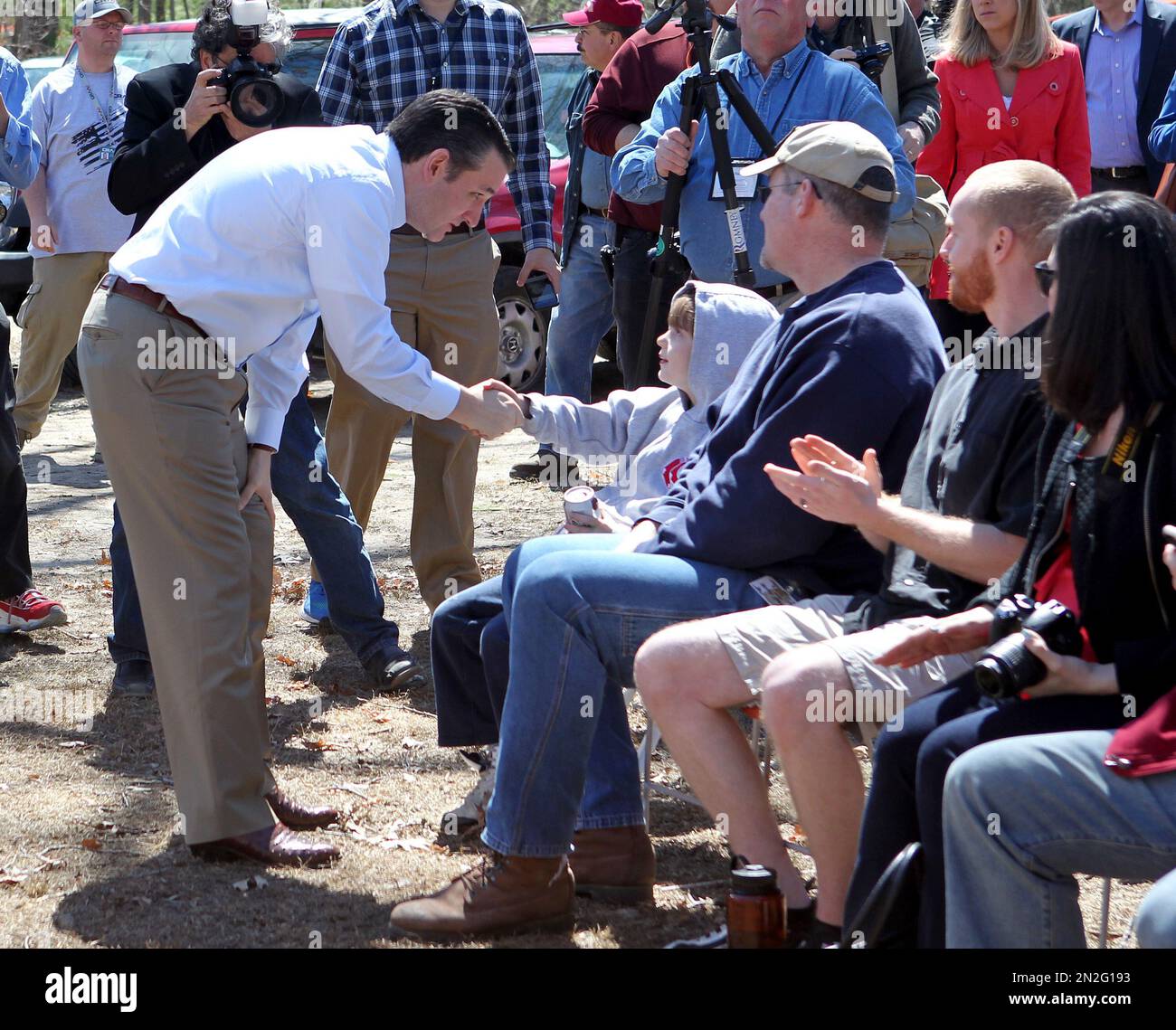 Presidential candidate Sen. Ted Cruz, R-Texas, shakes hands with Adam ...