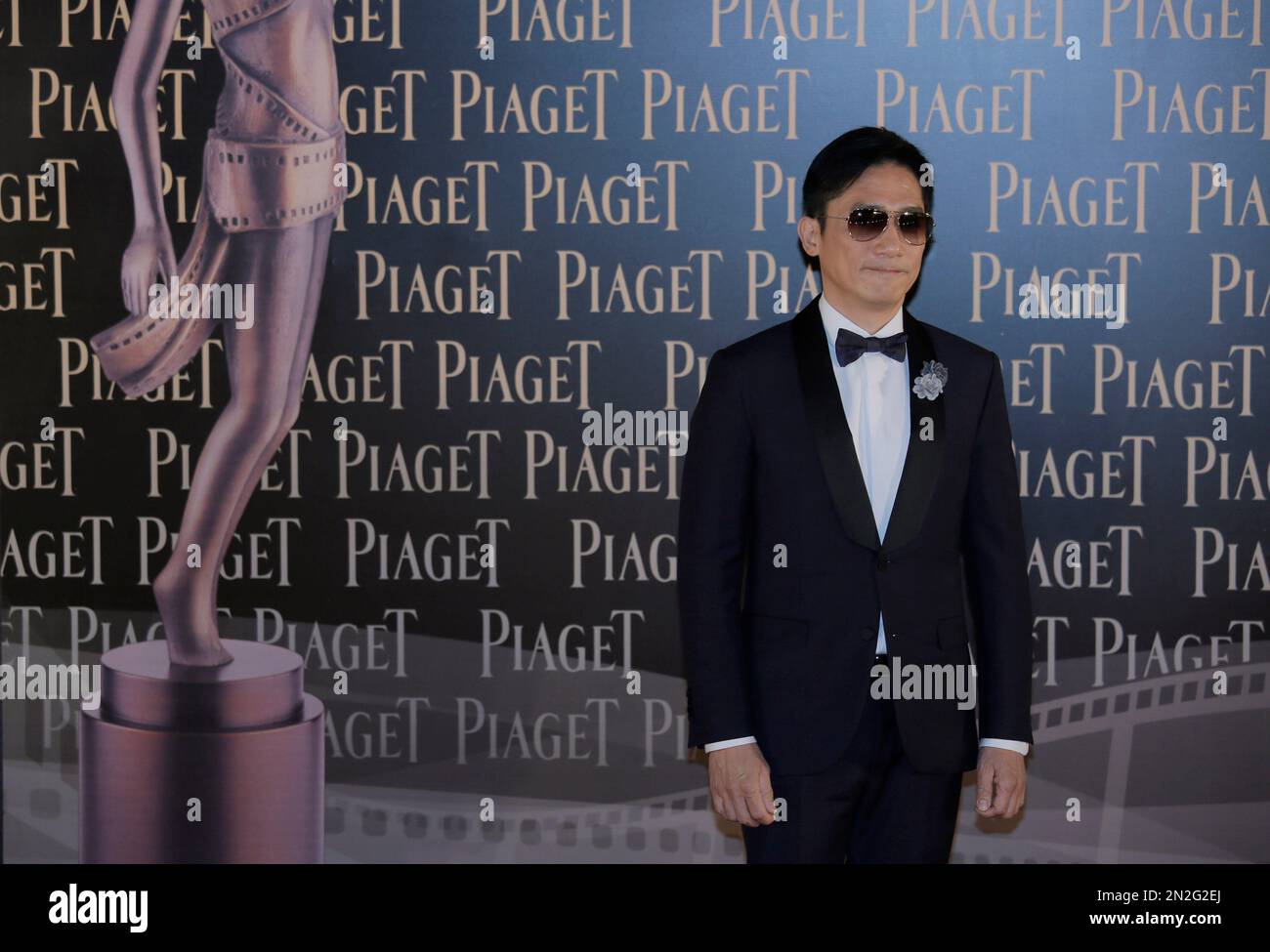 Hong Kong actor Tony Leung poses on the red carpet of the Hong Kong ...