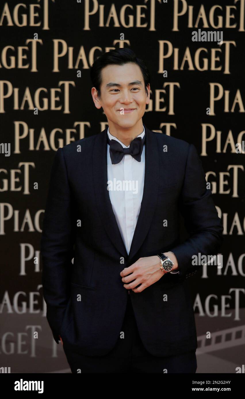 Taiwan actor Eddie Peng poses on the red carpet of the Hong Kong Film ...