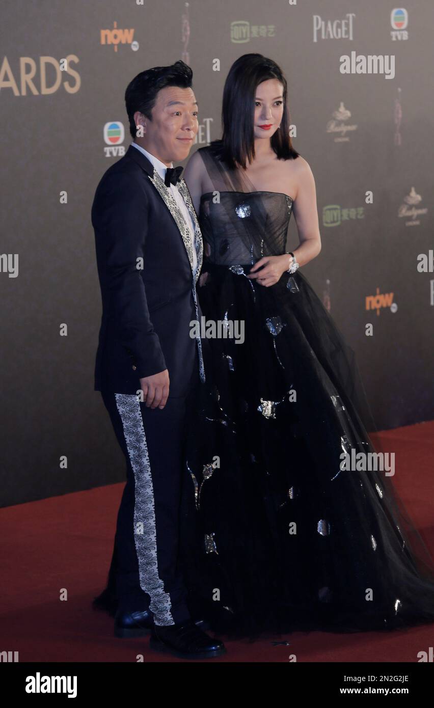 Chinese actress Zhao Wei, right, and actor Huang Bo pose on the red ...