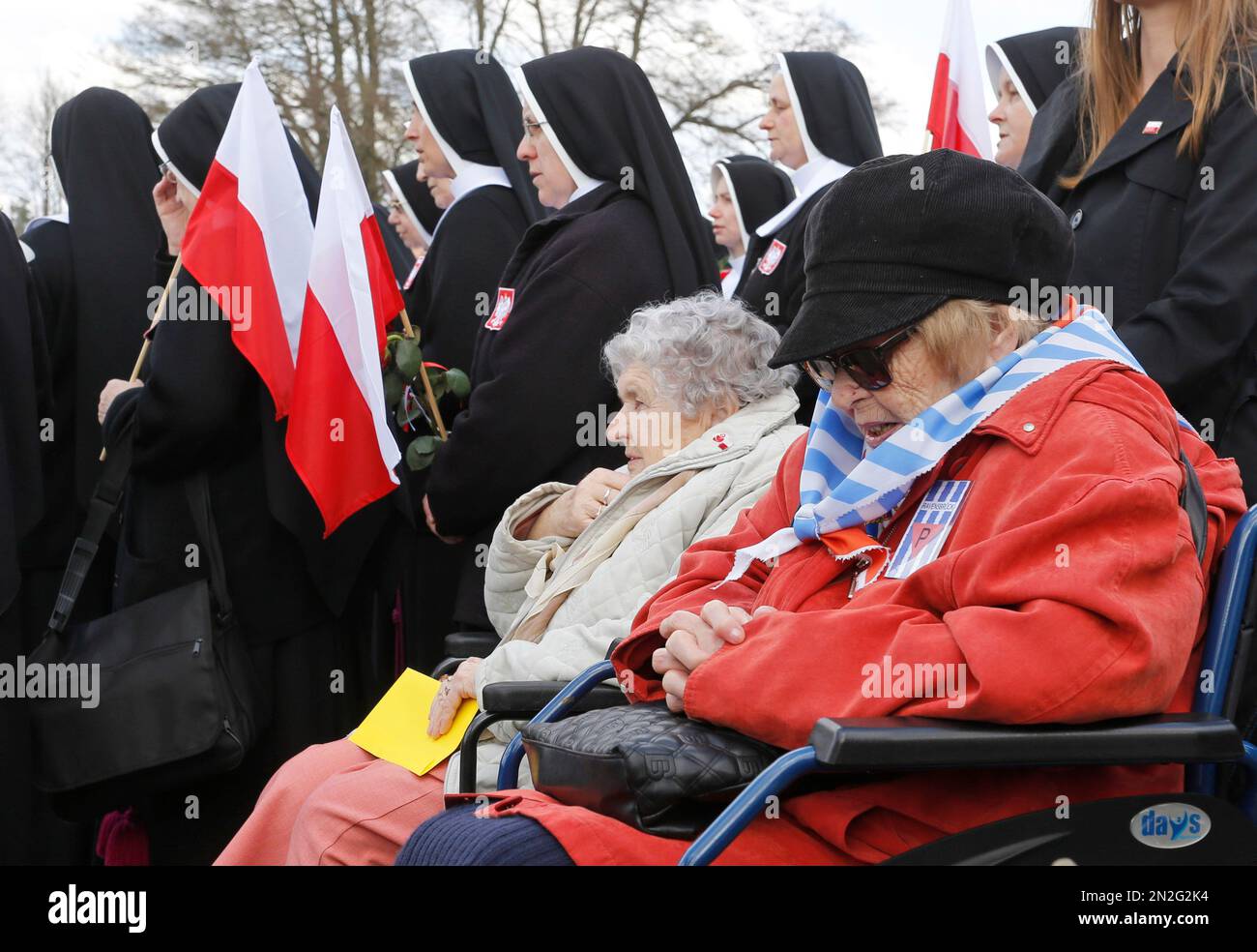 Camp survivors and Polish nuns pray the Angelus during ceremonies at ...