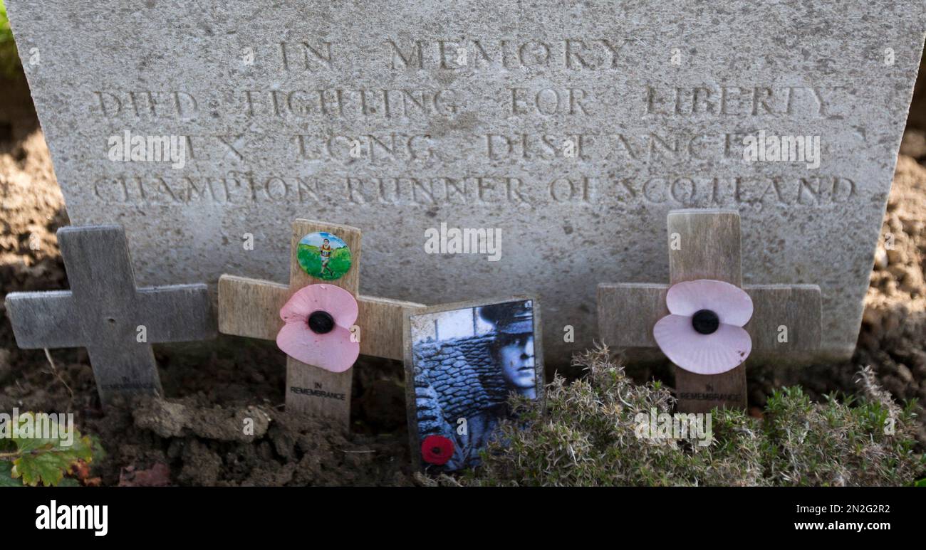 In this photo taken on April 9, 2015, wooden crosses and a photo stand ...