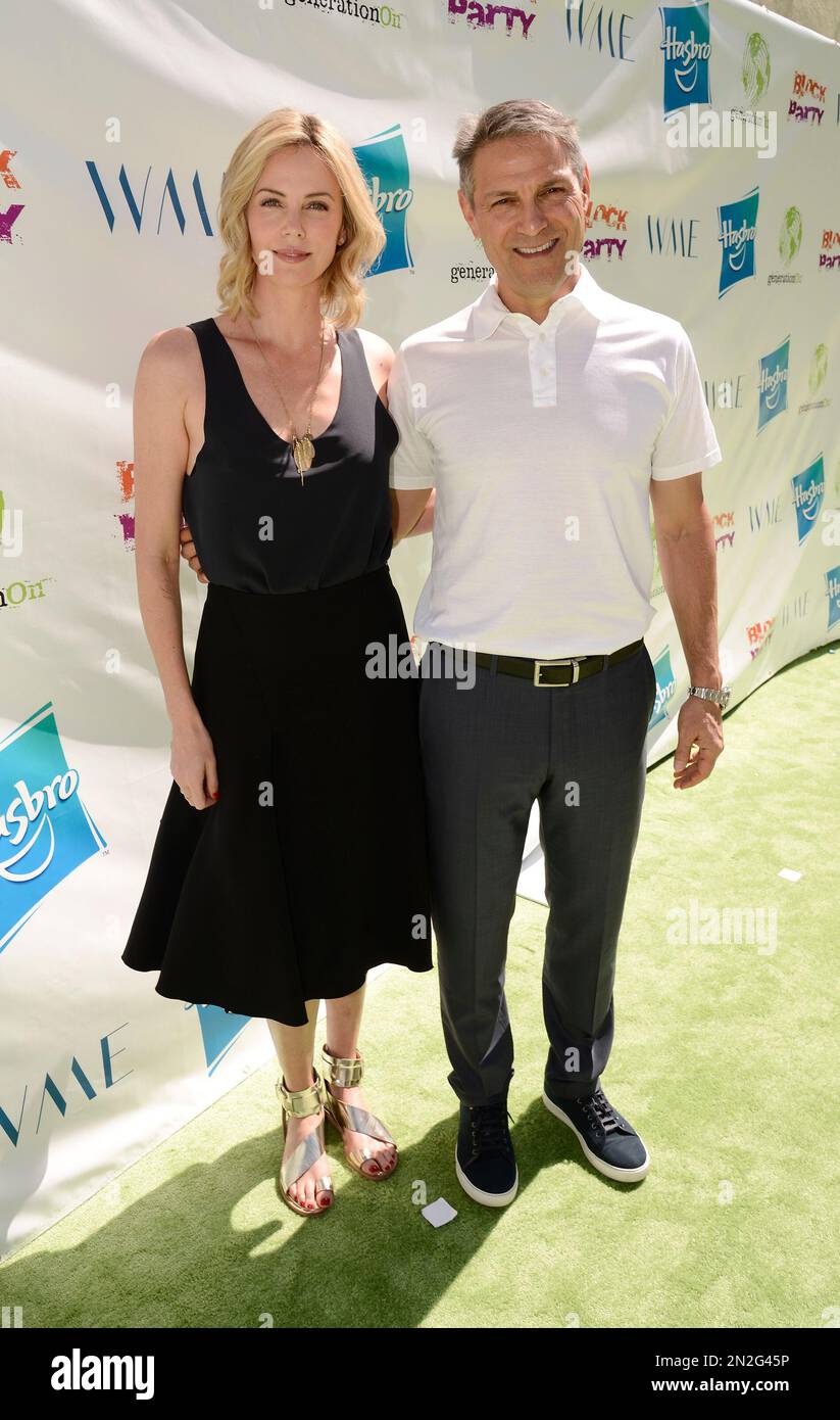 Actress Charlize Theron, left, and WME Co-CEO Ari Emanuel attend the ...