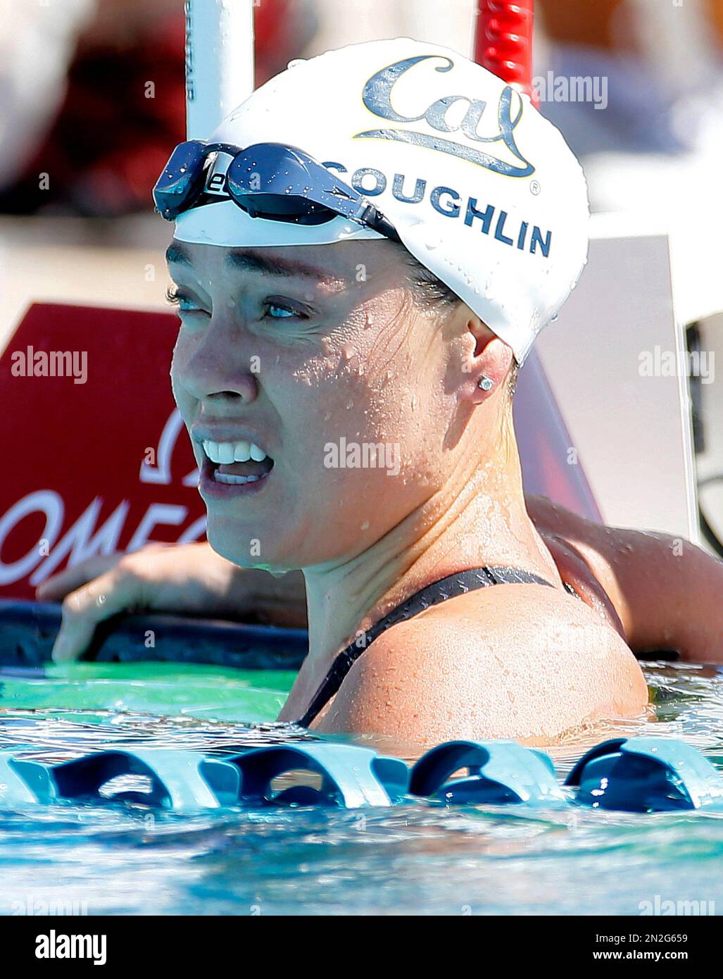 Natalie Coughlin looks at her time after competing in the women's 200 ...