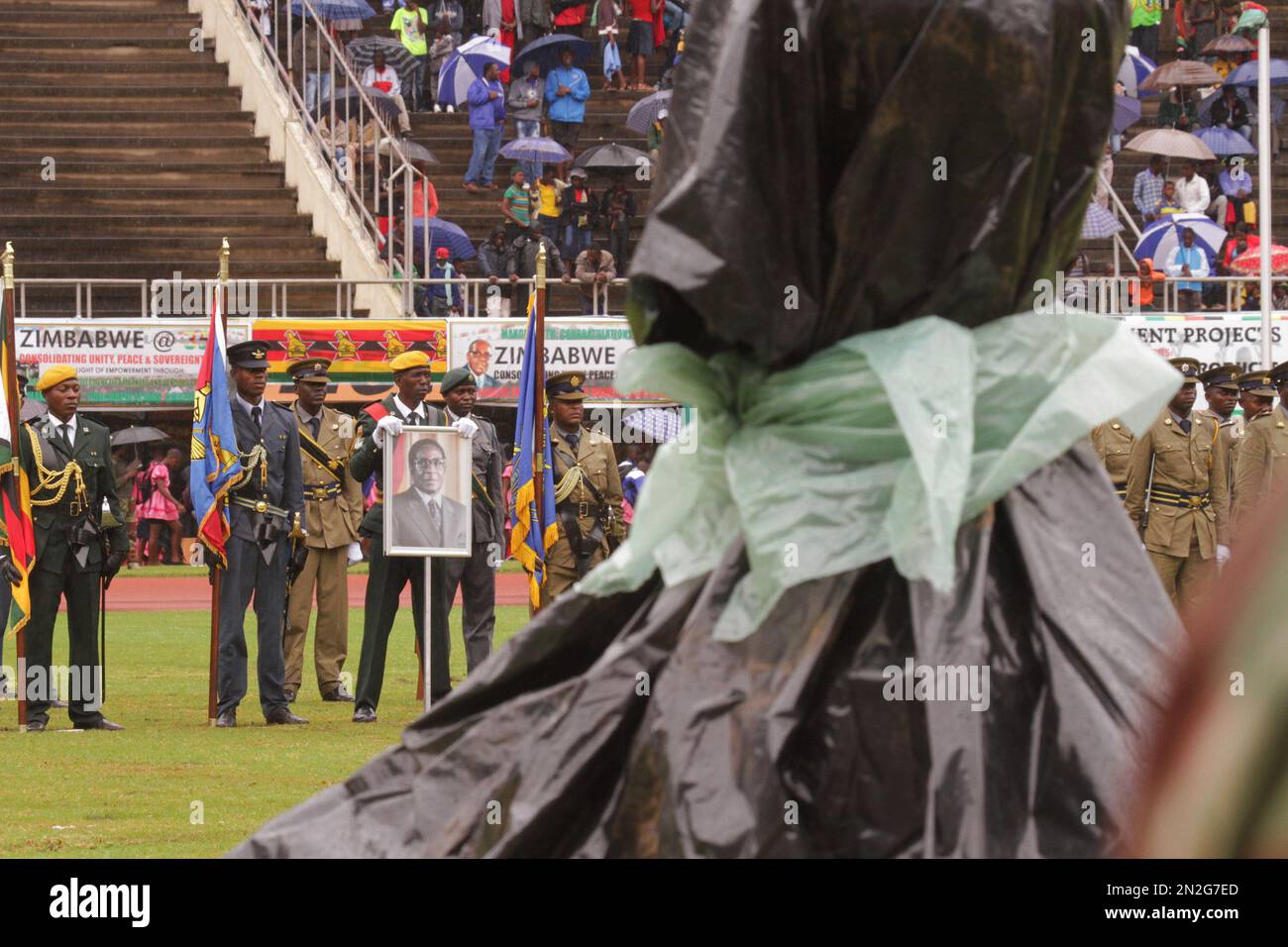 The podium for the lighting of the flame is covered in a plastic as ...