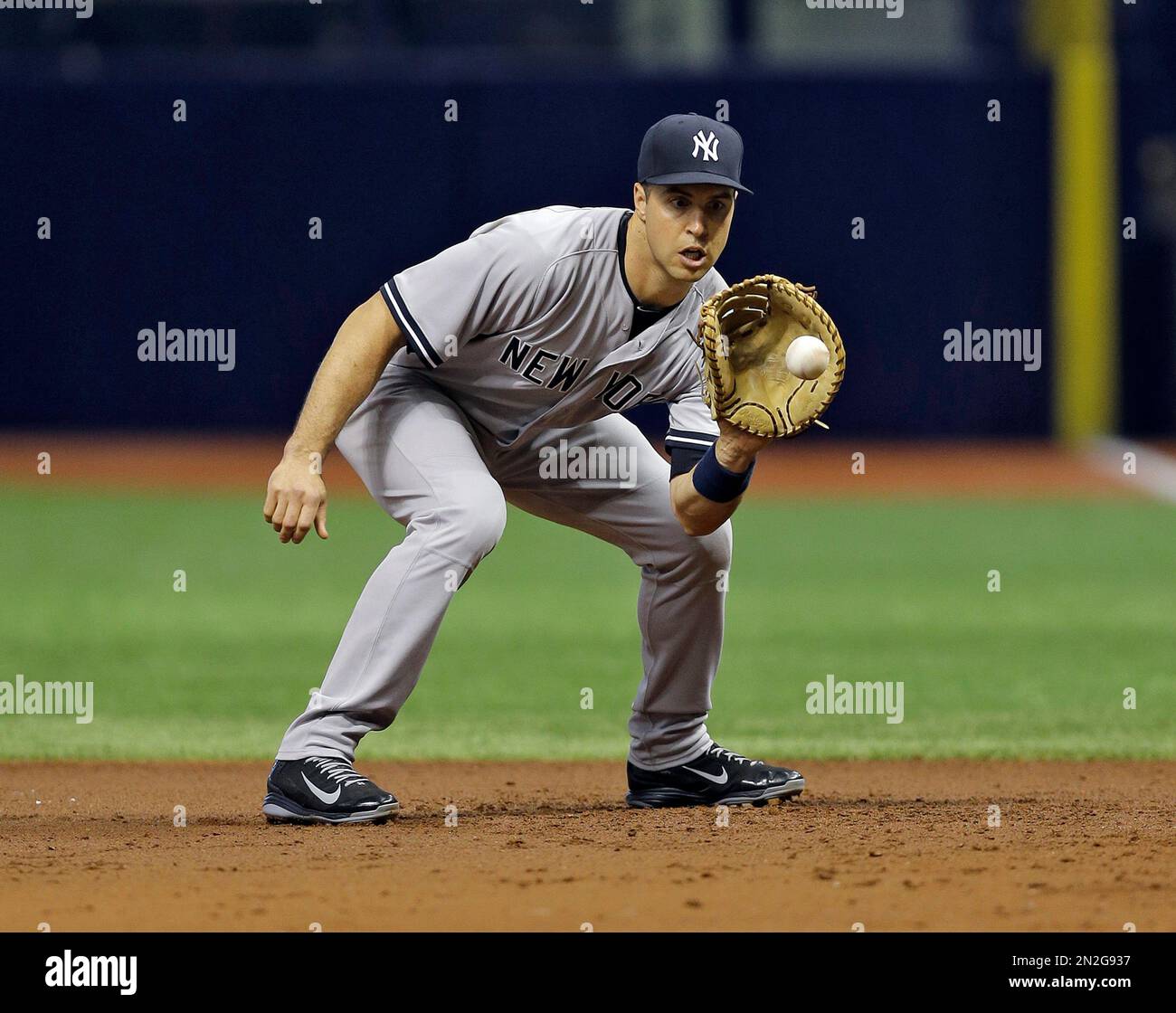 New York Yankees first baseman Mark Teixeira fields a ground ball by ...