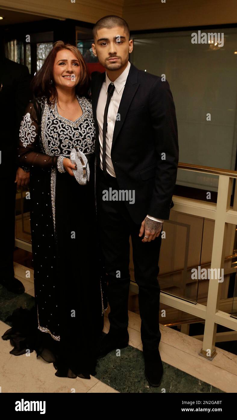 Zayn Malik, right, poses with his mother Trisha Malik, for ...