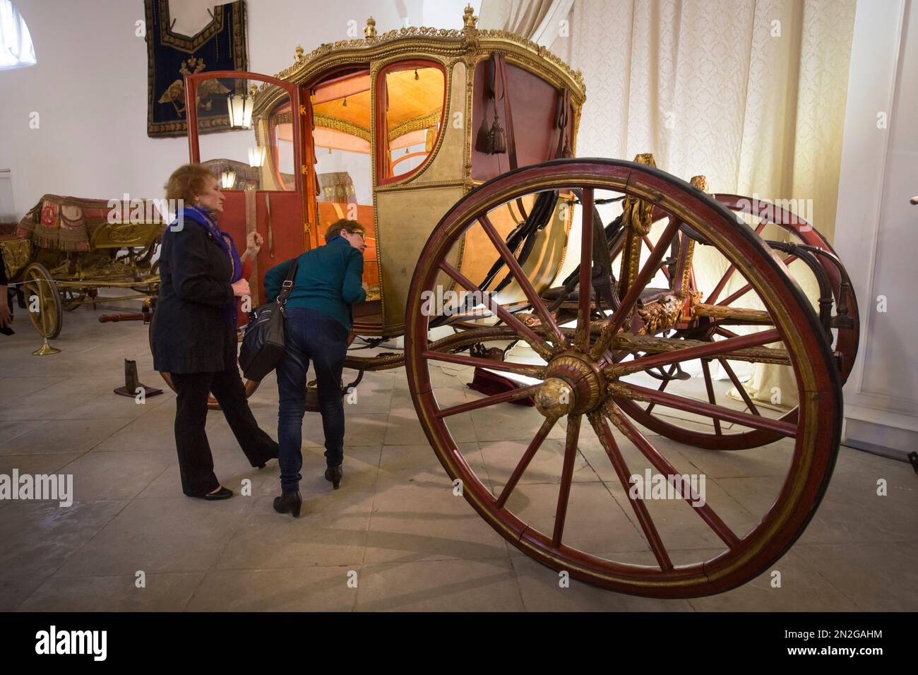Visitors examine the carriage of Russian Empress Catherine II ...