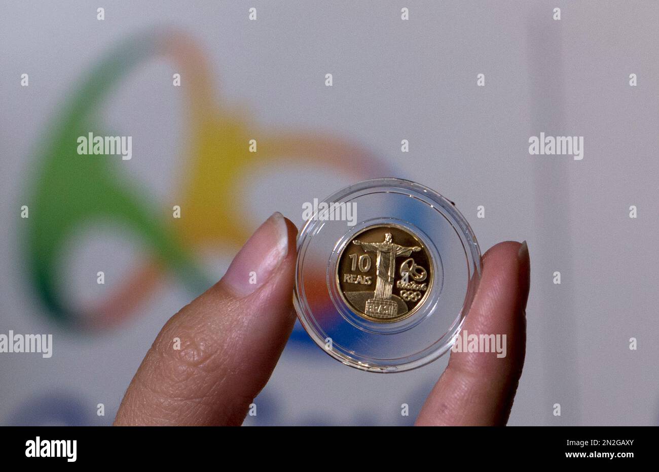 An attendant holds a Rio 2016 Olympic Games special edition ...