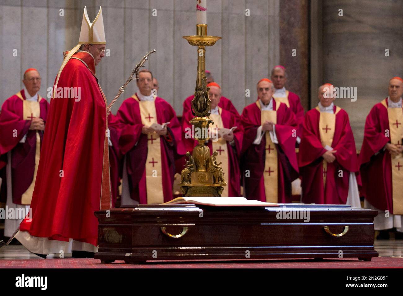 Pope Francis walks next to the coffin during the funeral service of ...