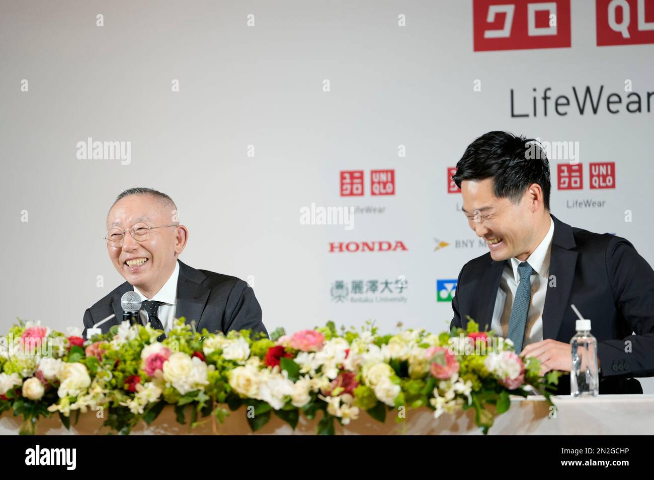 President and chief executive of Uniqlo Co. Ltd. Tadashi Yanai, left ...