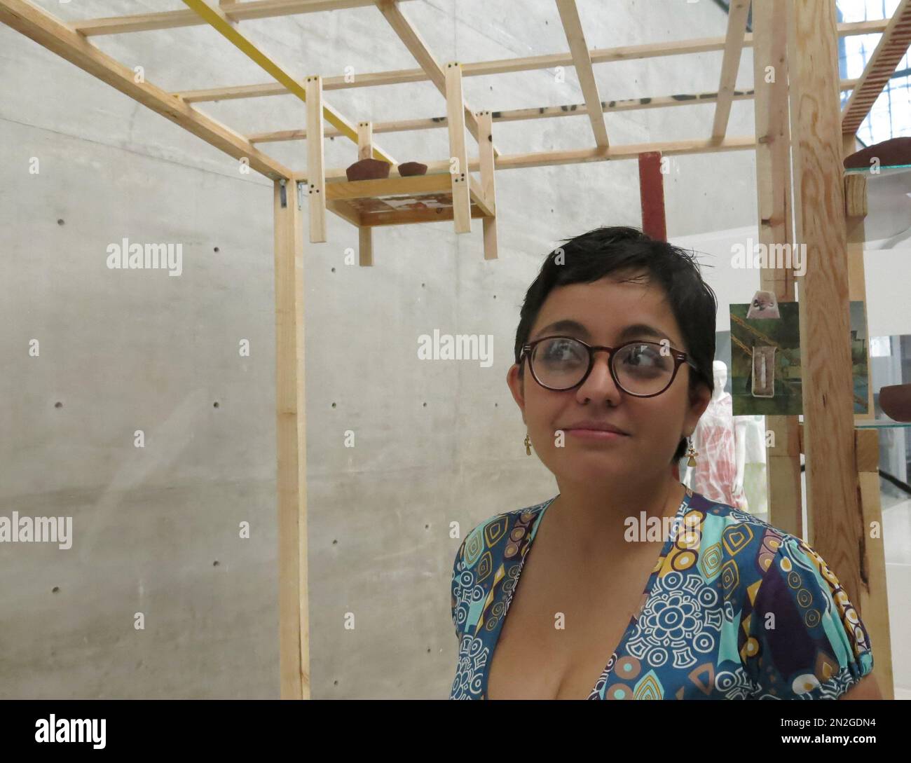 Mexican artist Maria Sosa poses for a picture next to her piece titled ...