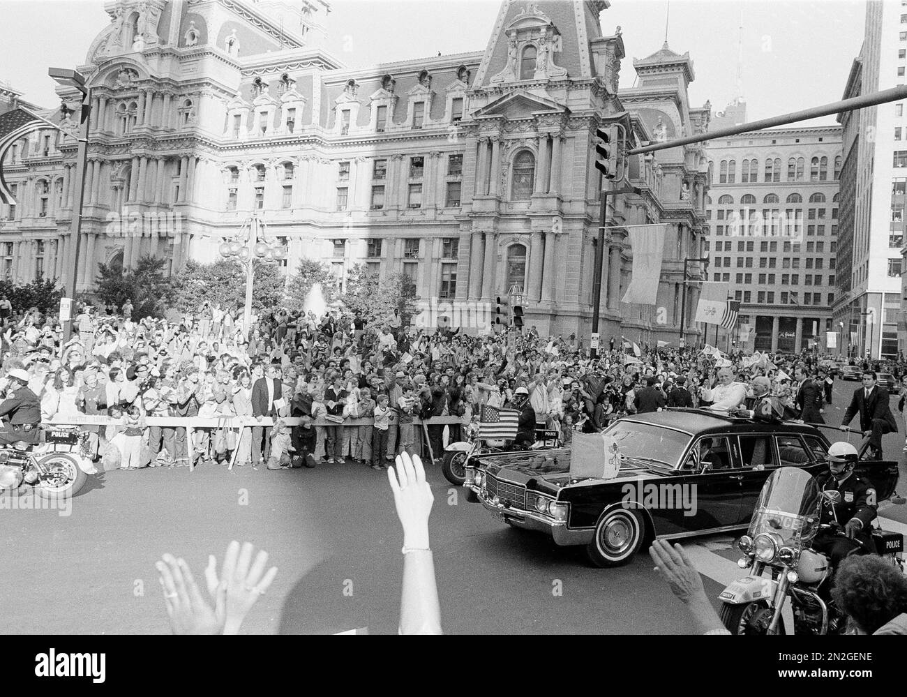 Pope John Paul II, in white, and Cardinal John Krol wave to the ...