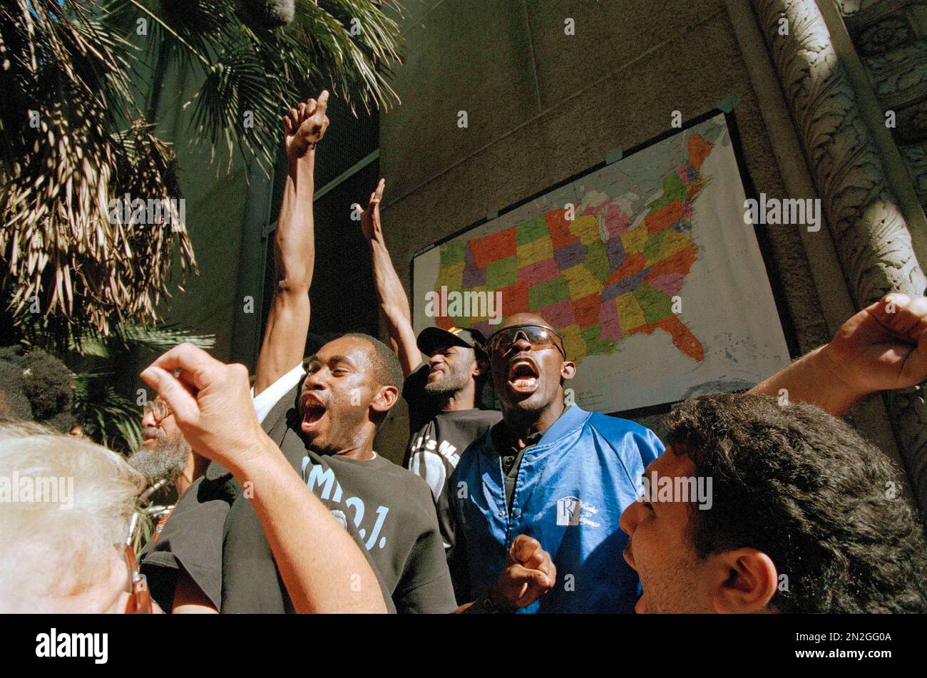 Supporters of O.J. Simpson react outside the Criminal Courts Building ...