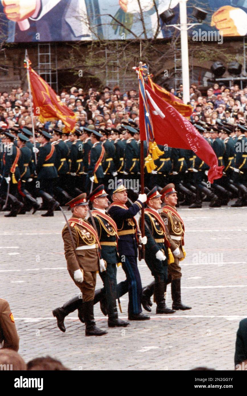 Soviet officers carry the Soviet banner that was raised over the ...