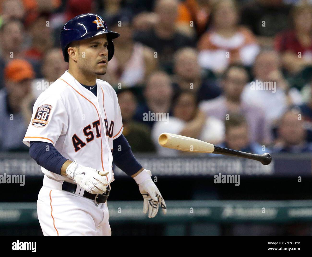 Houston Astros' Jose Altuve tosses his bat after striking out against ...