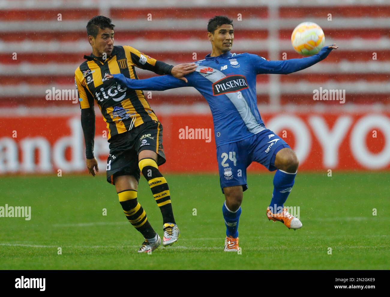 Rodrigo Ramallo of Bolivia's The Strongest, left, fights for the ball ...