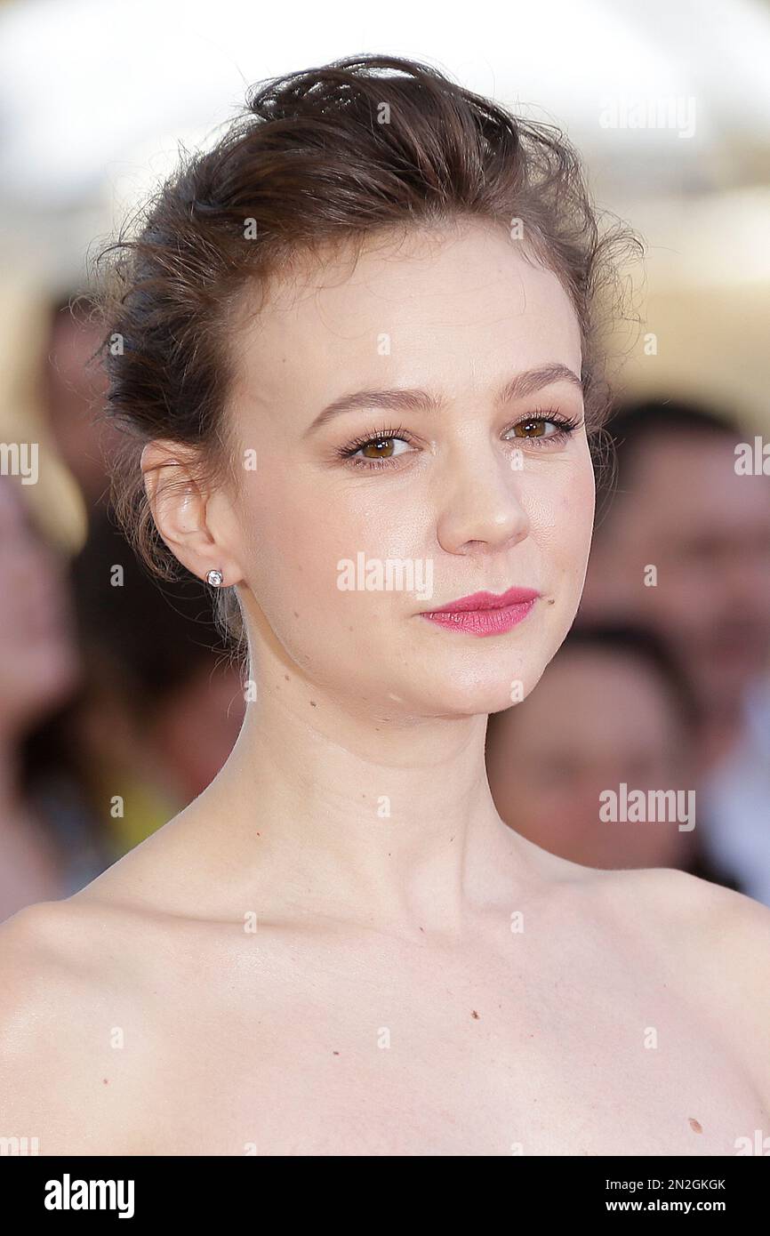 Carey Mulligan poses for photographers upon arrival at the BFI ...