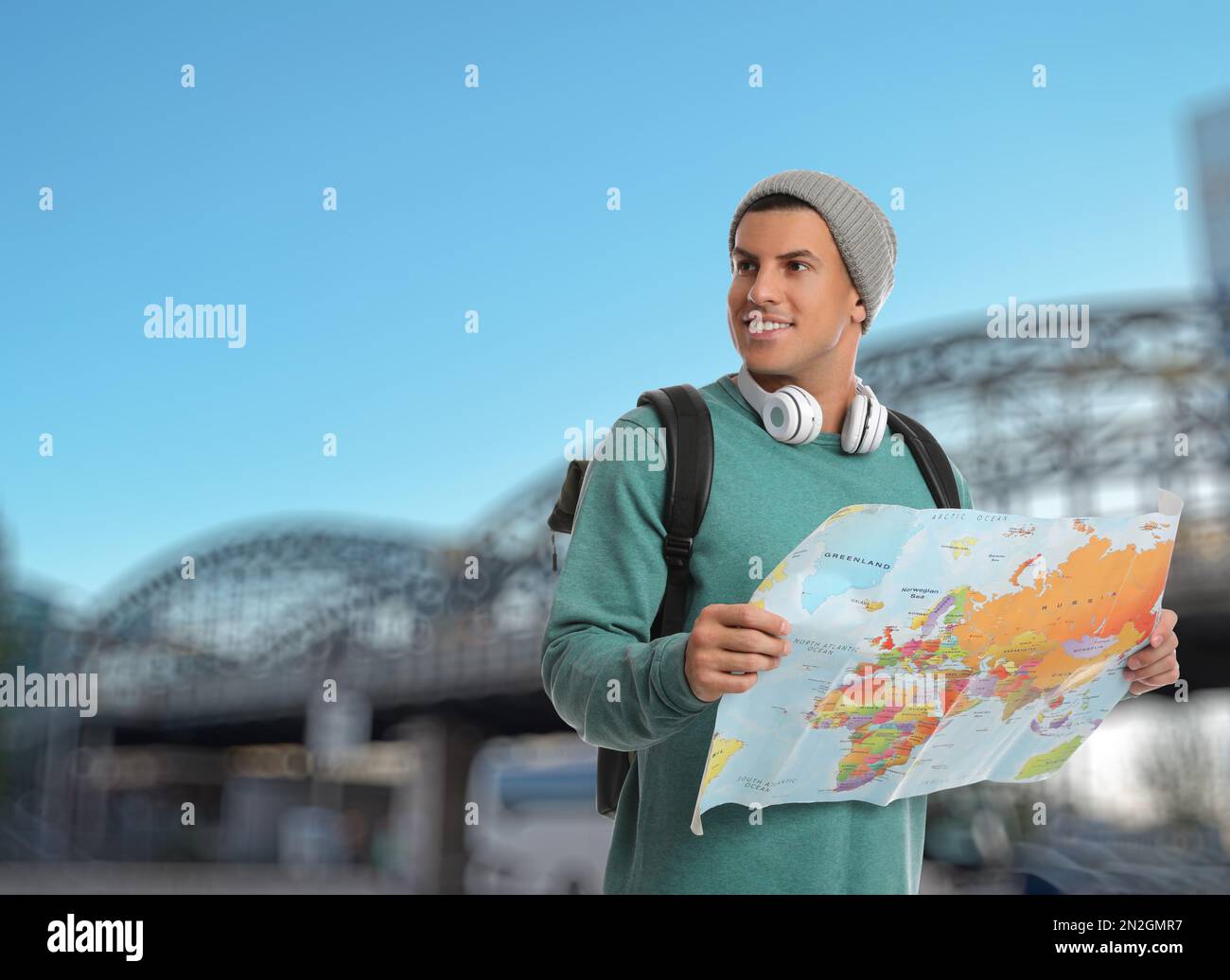 Happy traveler in headphones hi-res stock photography and images - Alamy