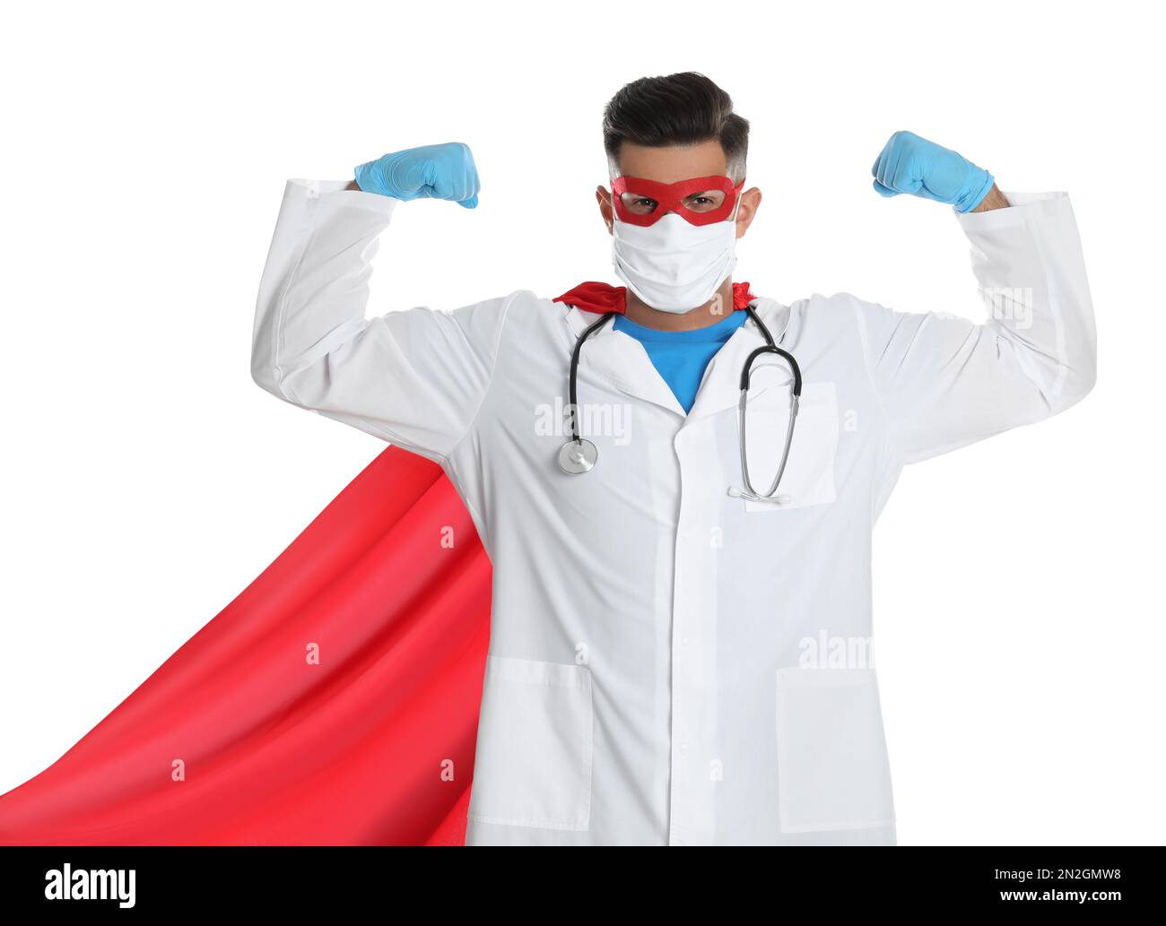 Doctor wearing face mask and cape on white background. Super hero power ...