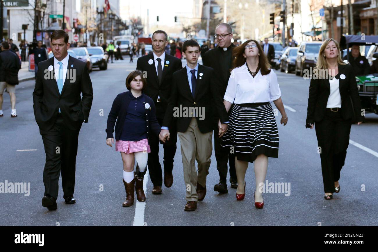 Boston Marathon survivor Jane Richard holds the hand of her brother ...