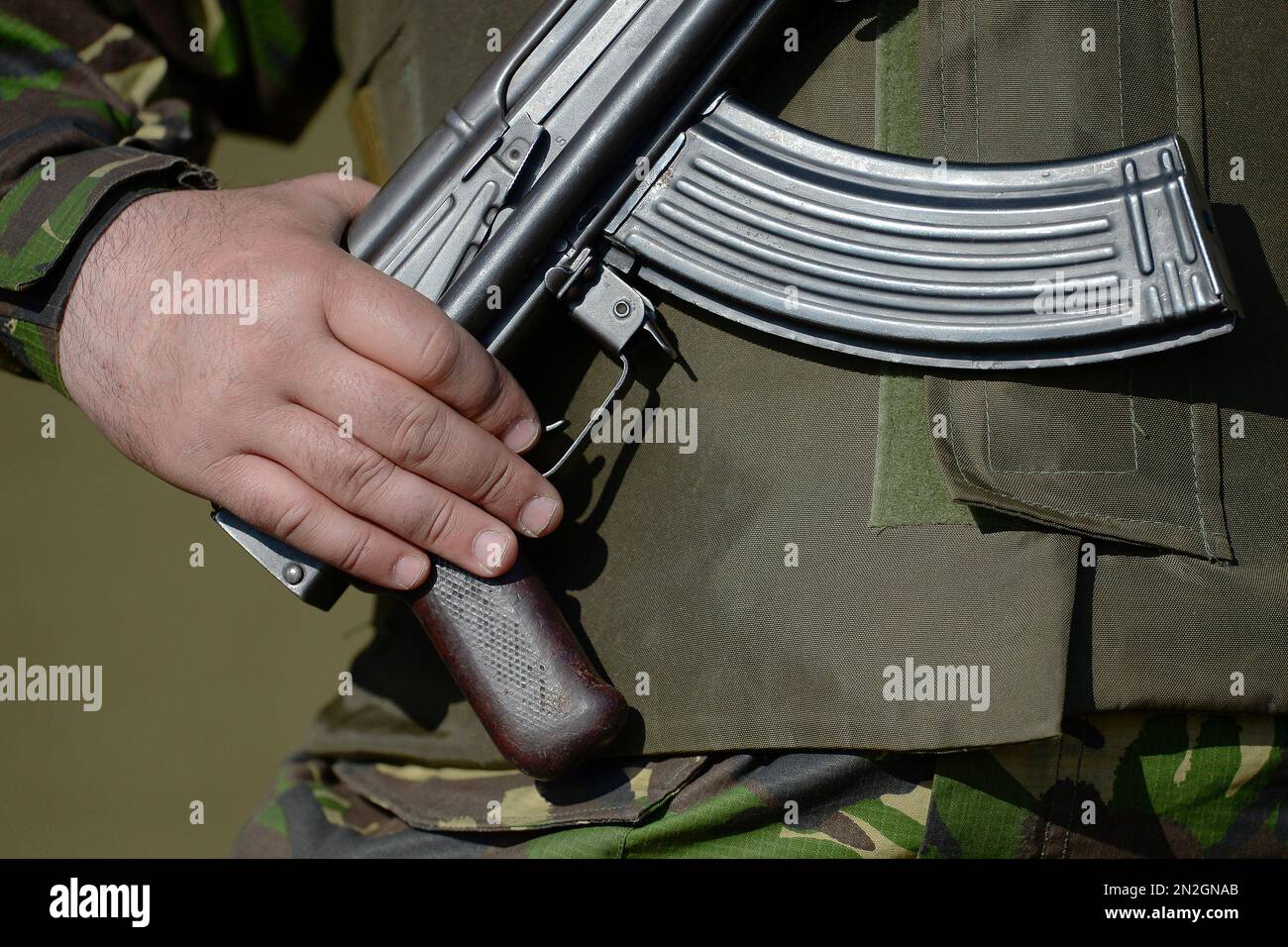 A Romanian Military Police officer stands guard in front of military ...