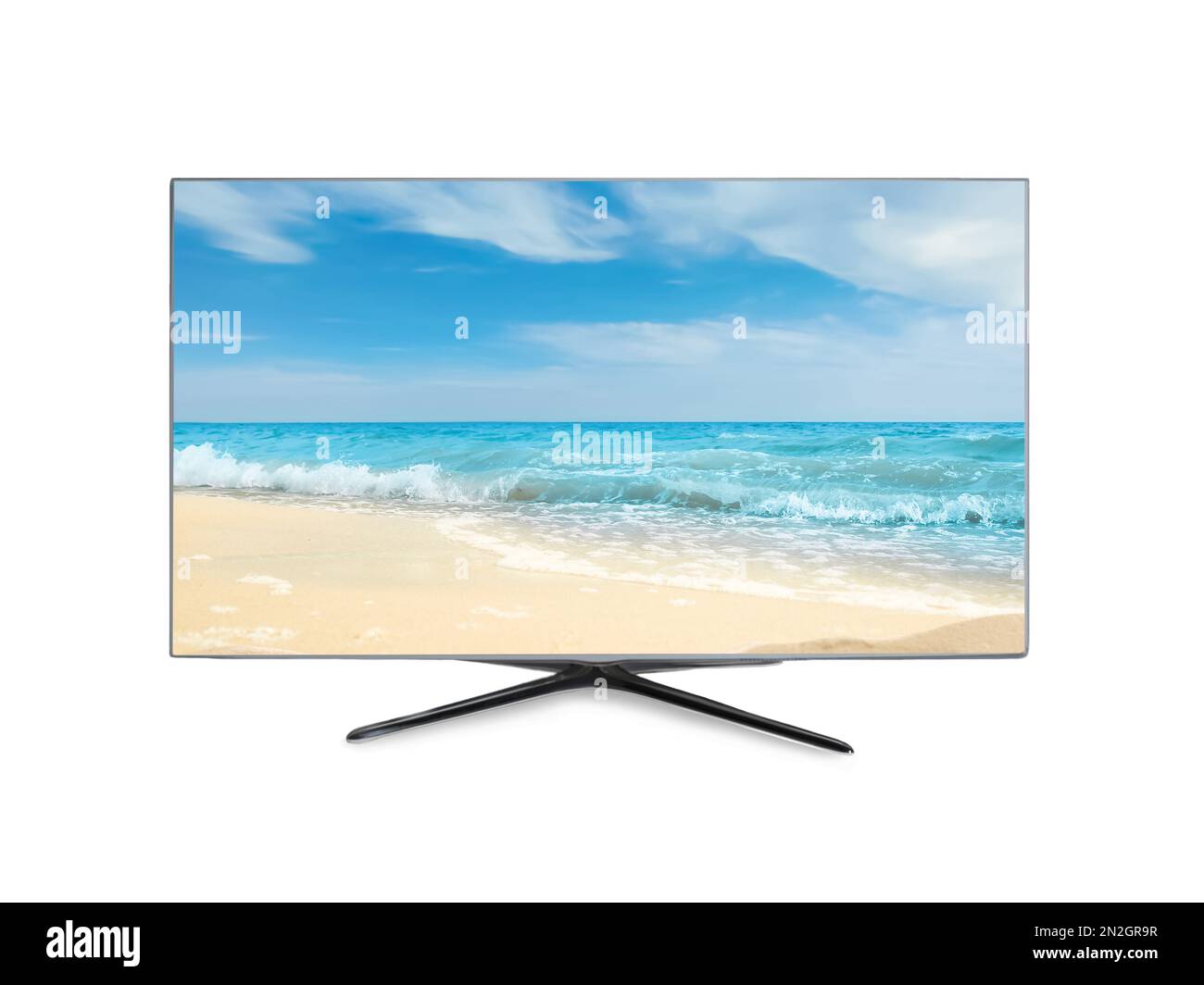 Modern wide screen TV monitor showing ocean and sandy beach, isolated ...