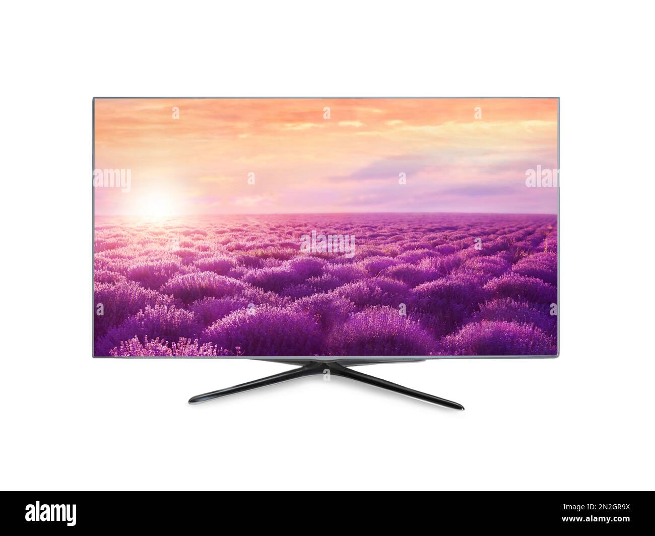 Modern wide screen TV monitor showing bright lavender field, isolated ...