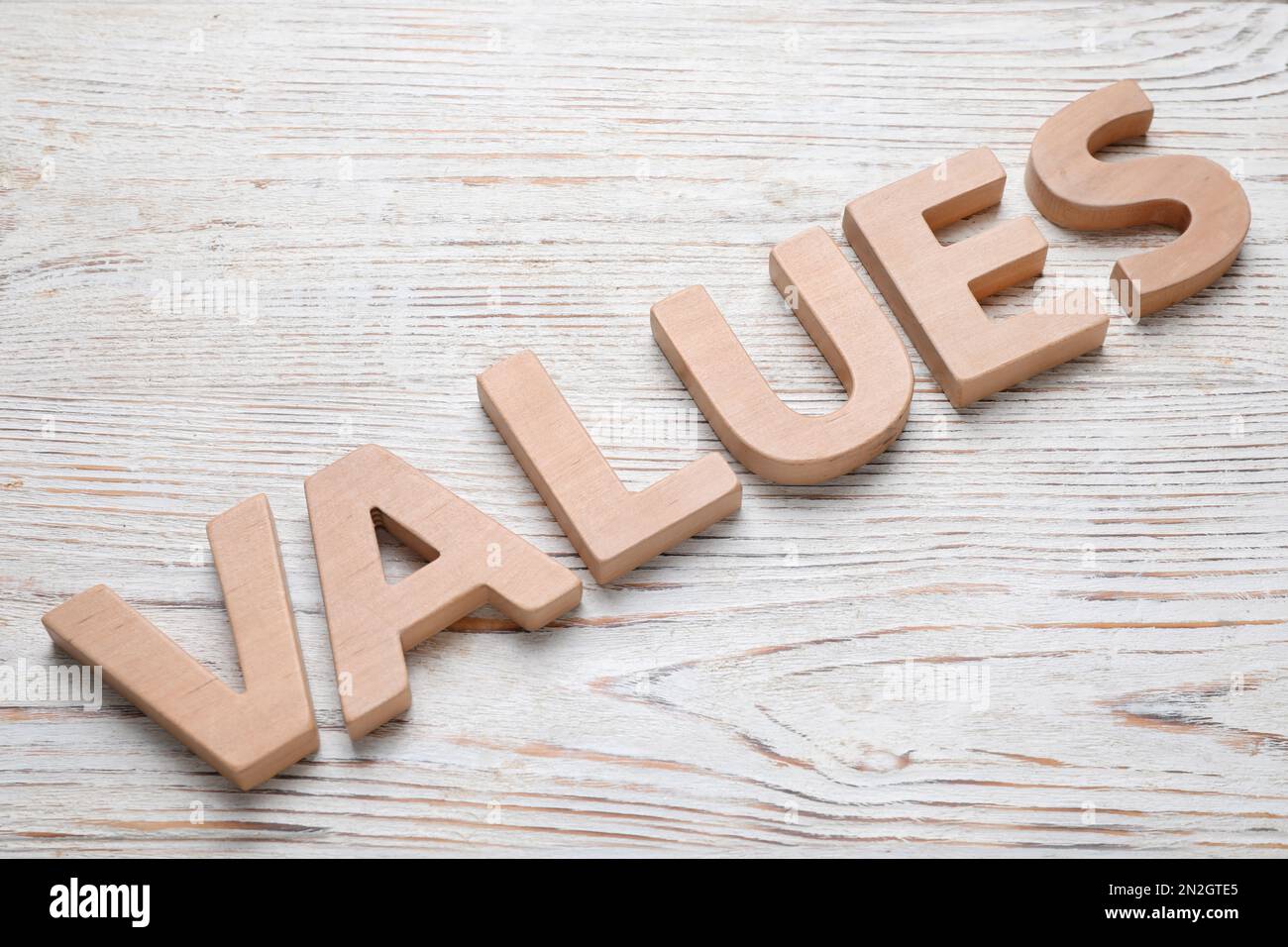 Word VALUES made with letters on white wooden background Stock Photo ...