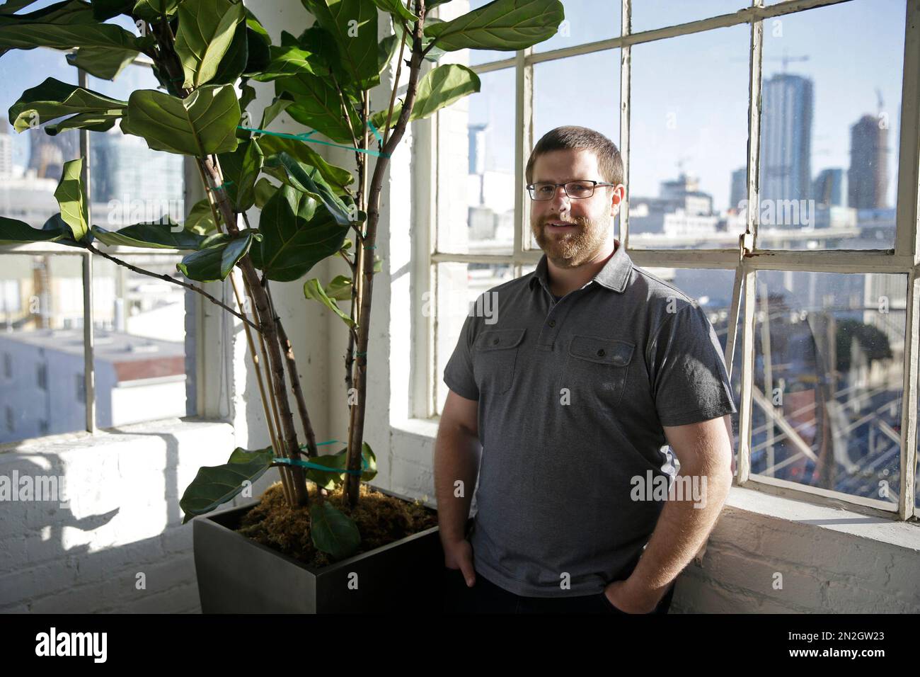 Life360 co-founder and president Alex Haro poses at his company ...