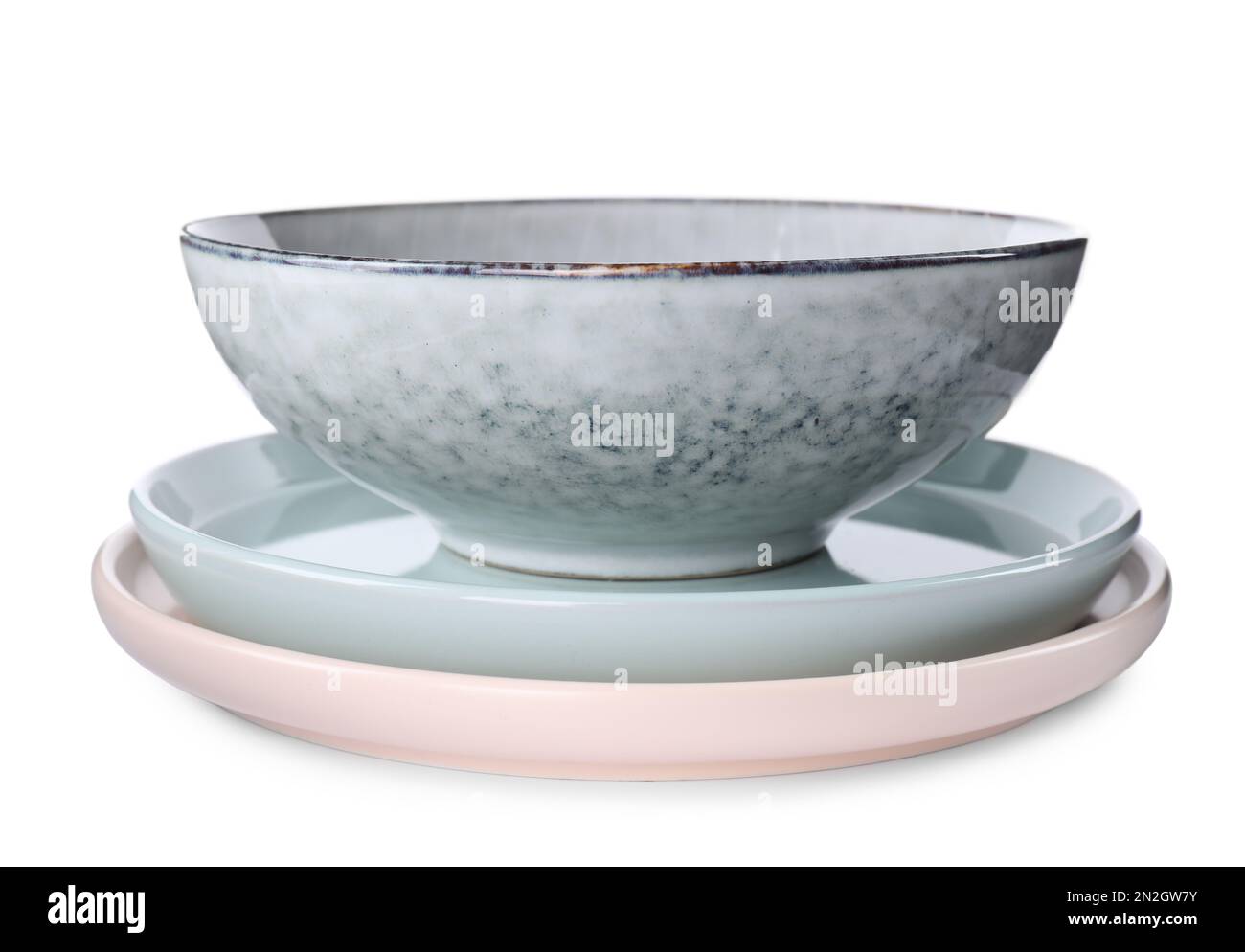 Set of clean tableware isolated on white Stock Photo - Alamy