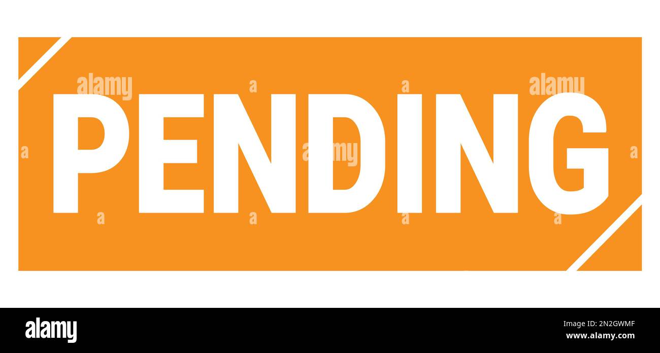 PENDING text written on orange grungy stamp sign Stock Photo - Alamy