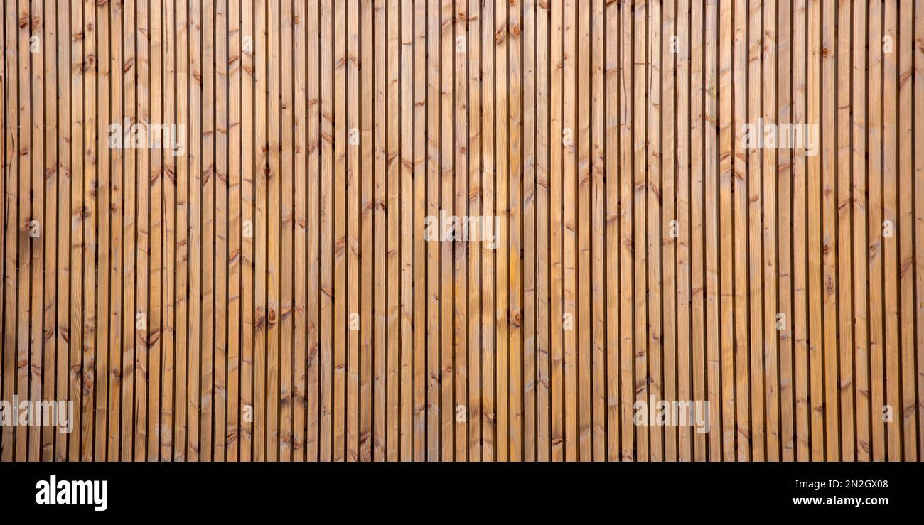 brown natural wall made of wooden nature planks for background web ...