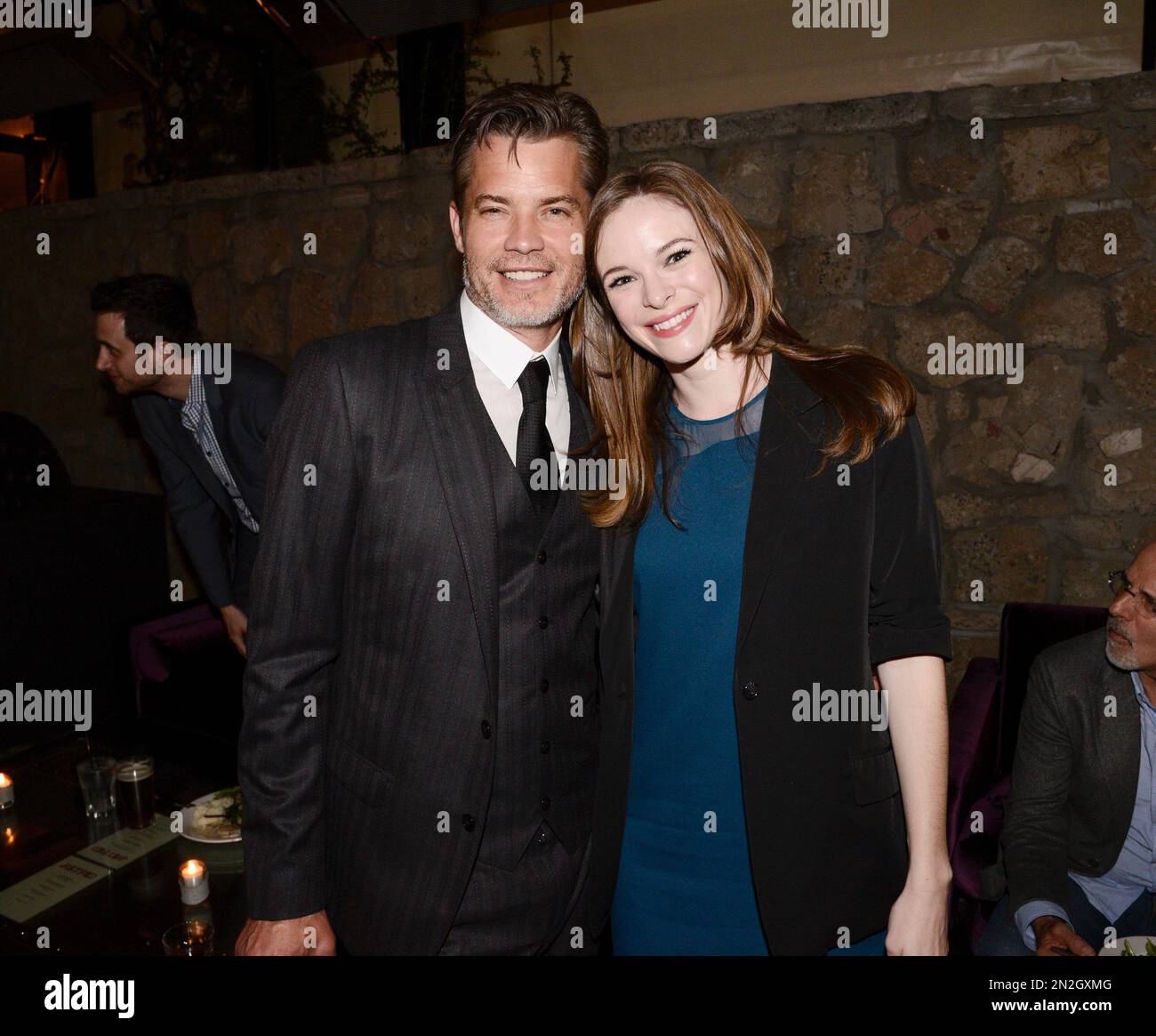 Actor Timothy Olyphant, left, and actress Danielle Panabaker attend an ...