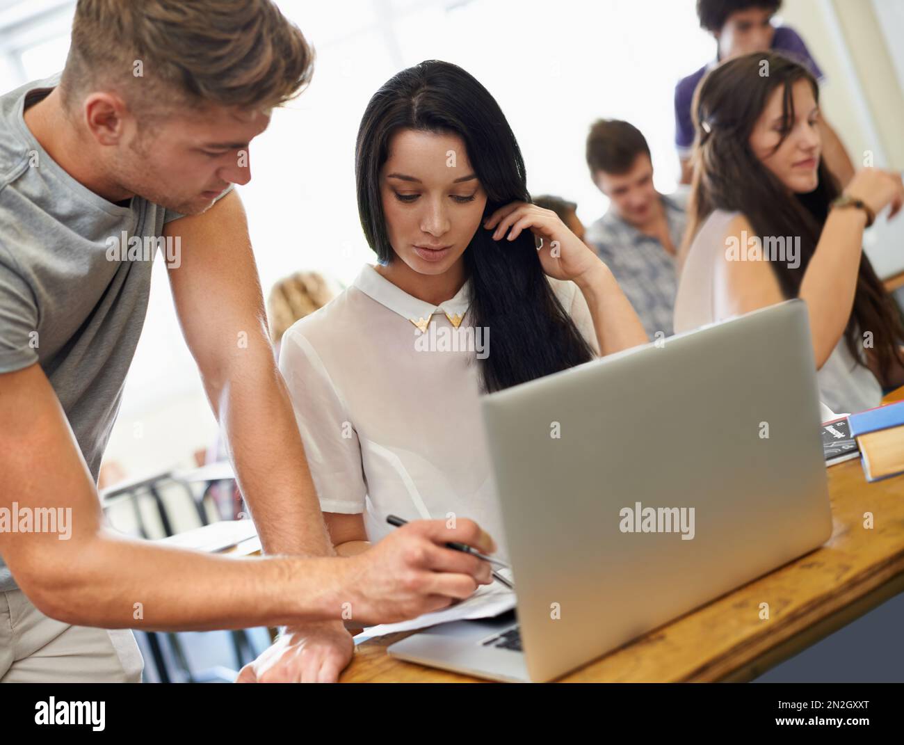 Students helping other classroom hi-res stock photography and images ...