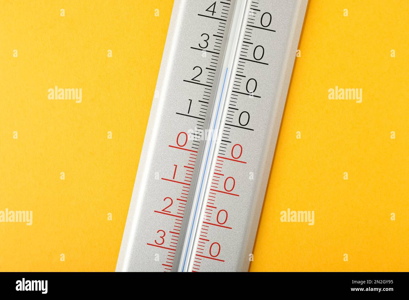 Modern weather thermometer on yellow background, closeup Stock Photo ...