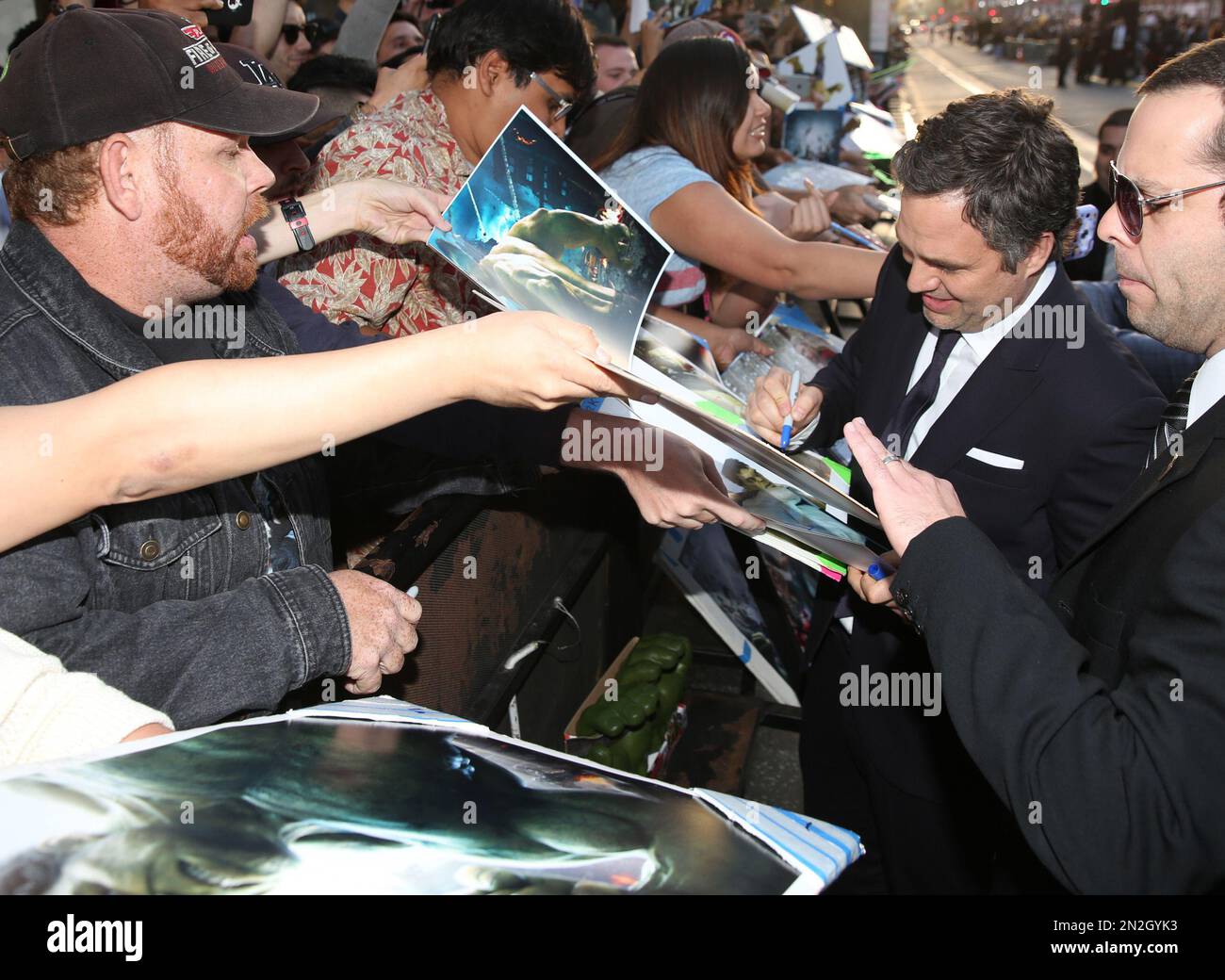 Mark Ruffalo signs autographs at the Los Angeles premiere of "Avengers ...