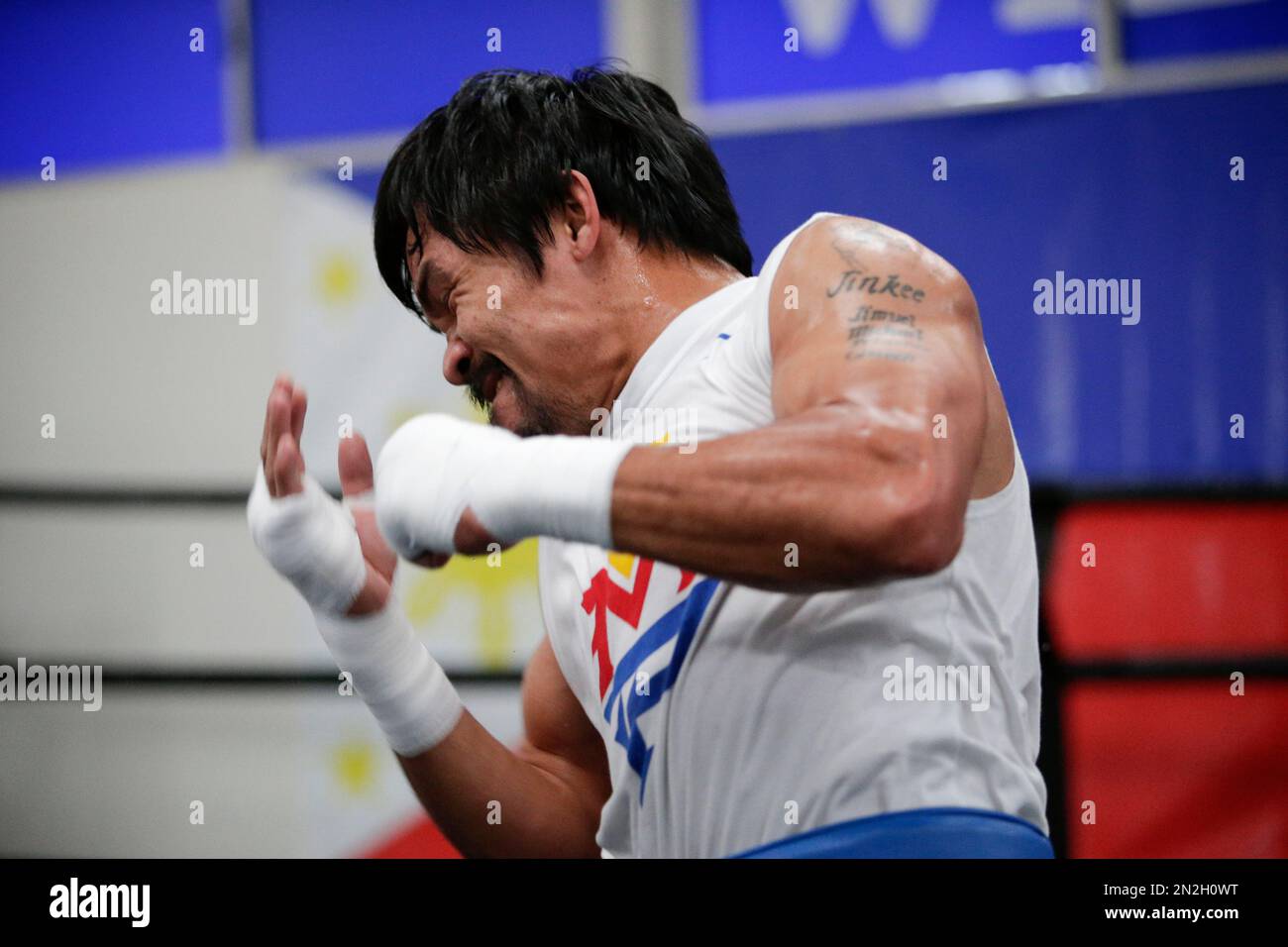 Boxer Manny Pacquiao, of the Philippines, shadow-boxes during his ...