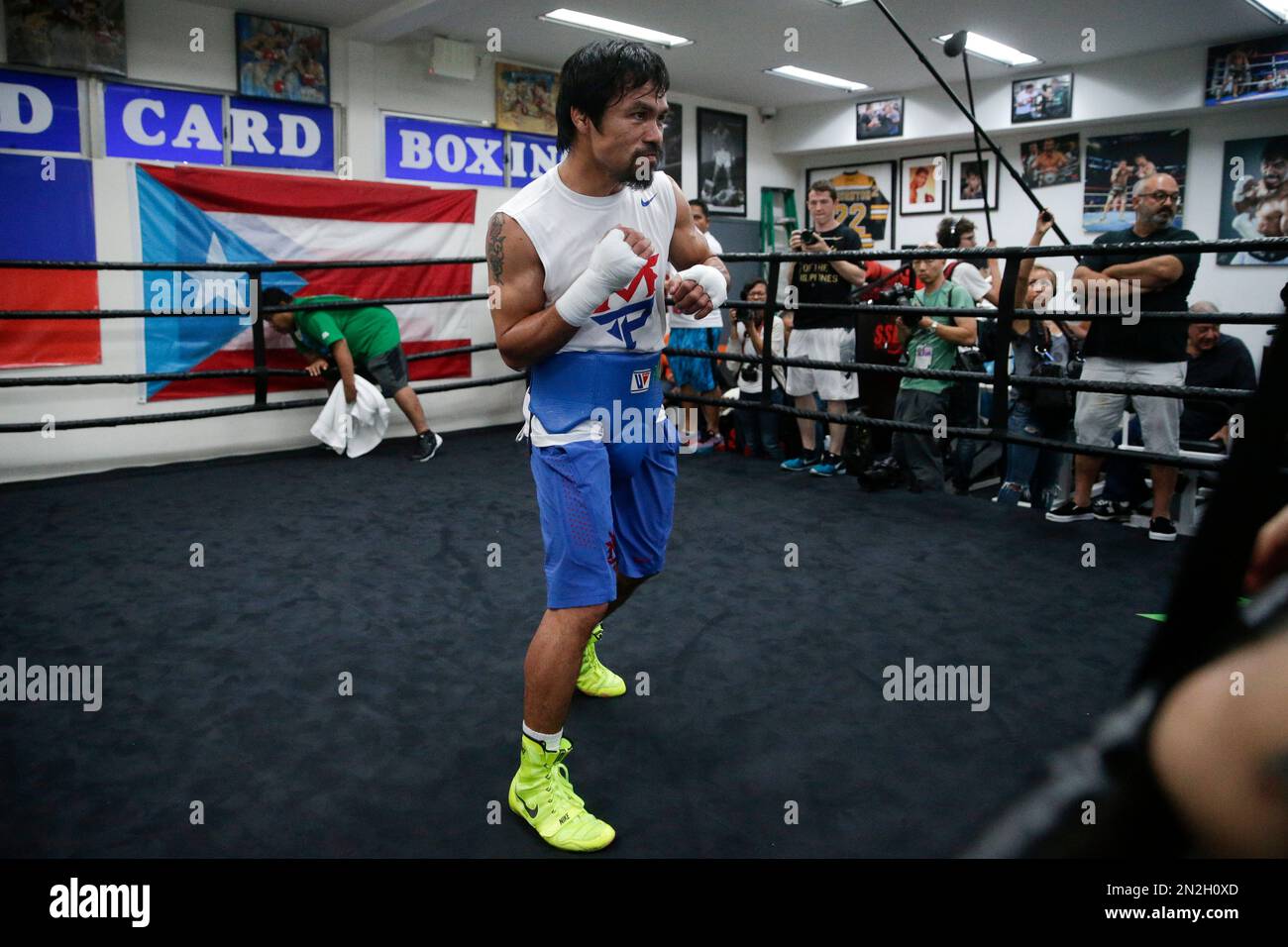 Boxer Manny Pacquiao, of the Philippines, shadow-boxes during his ...