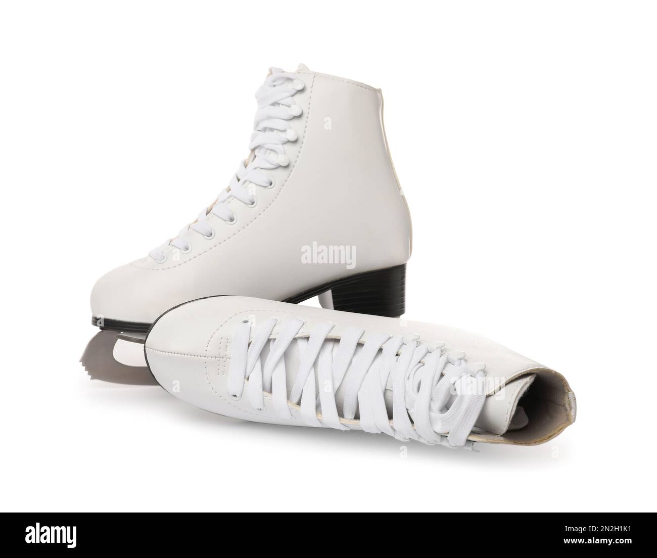 Pair of figure ice skates isolated on white Stock Photo - Alamy