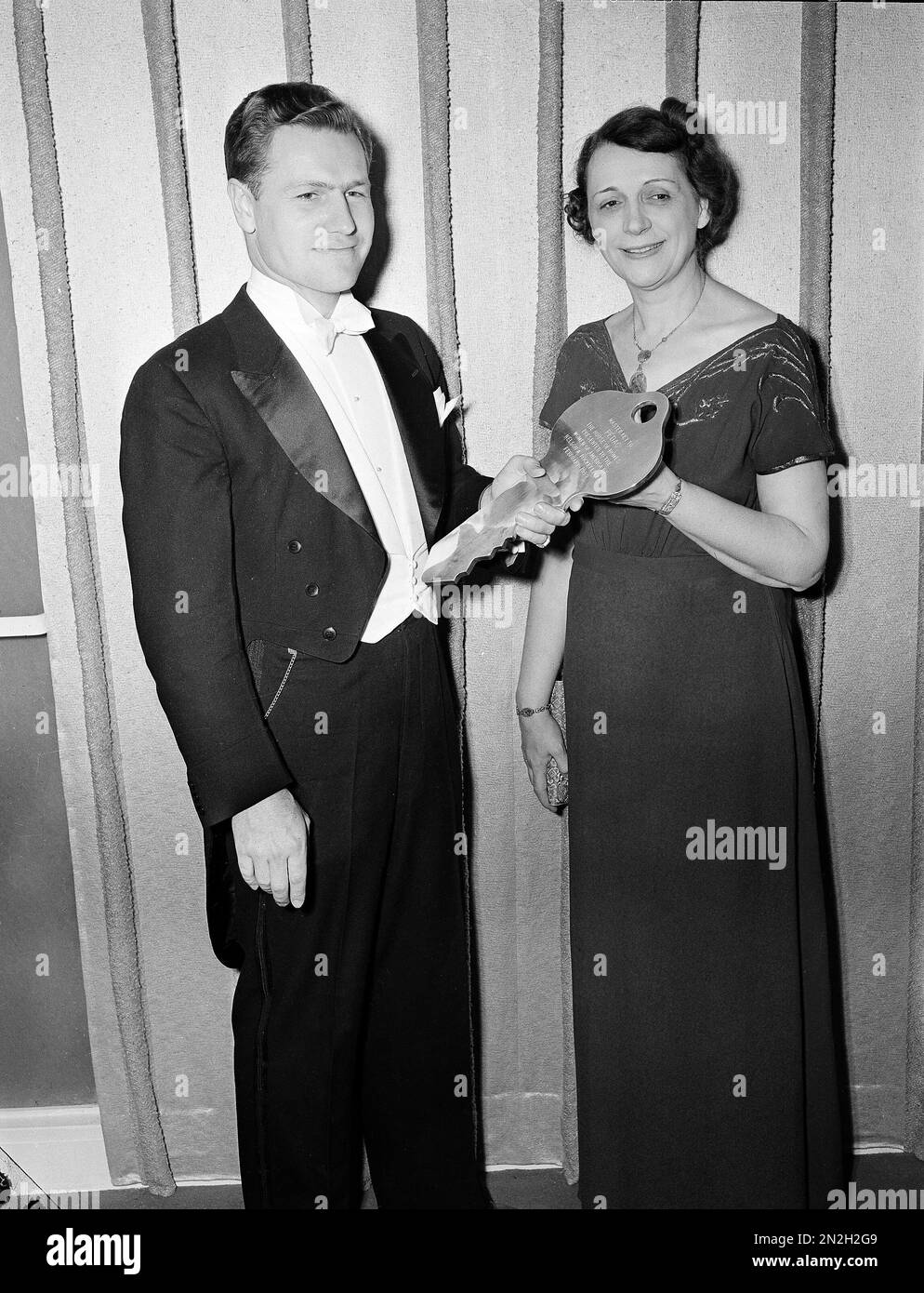 Nelson Rockefeller, left, presents Ruth Haller Ottaway, president of ...