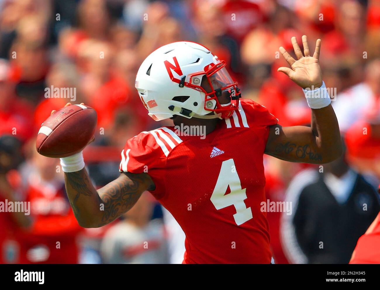 Red Team quarterback Tommy Armstrong Jr. (4) throws during Nebraska's ...