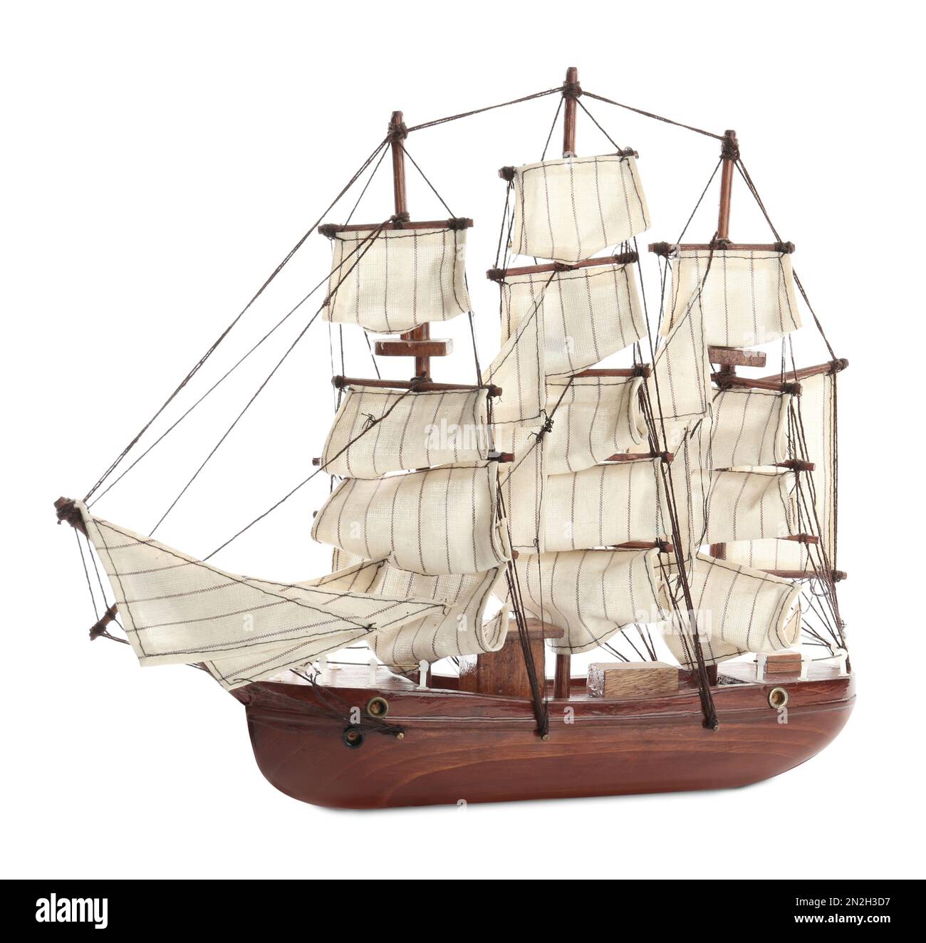 Beautiful small ship model isolated on white Stock Photo - Alamy