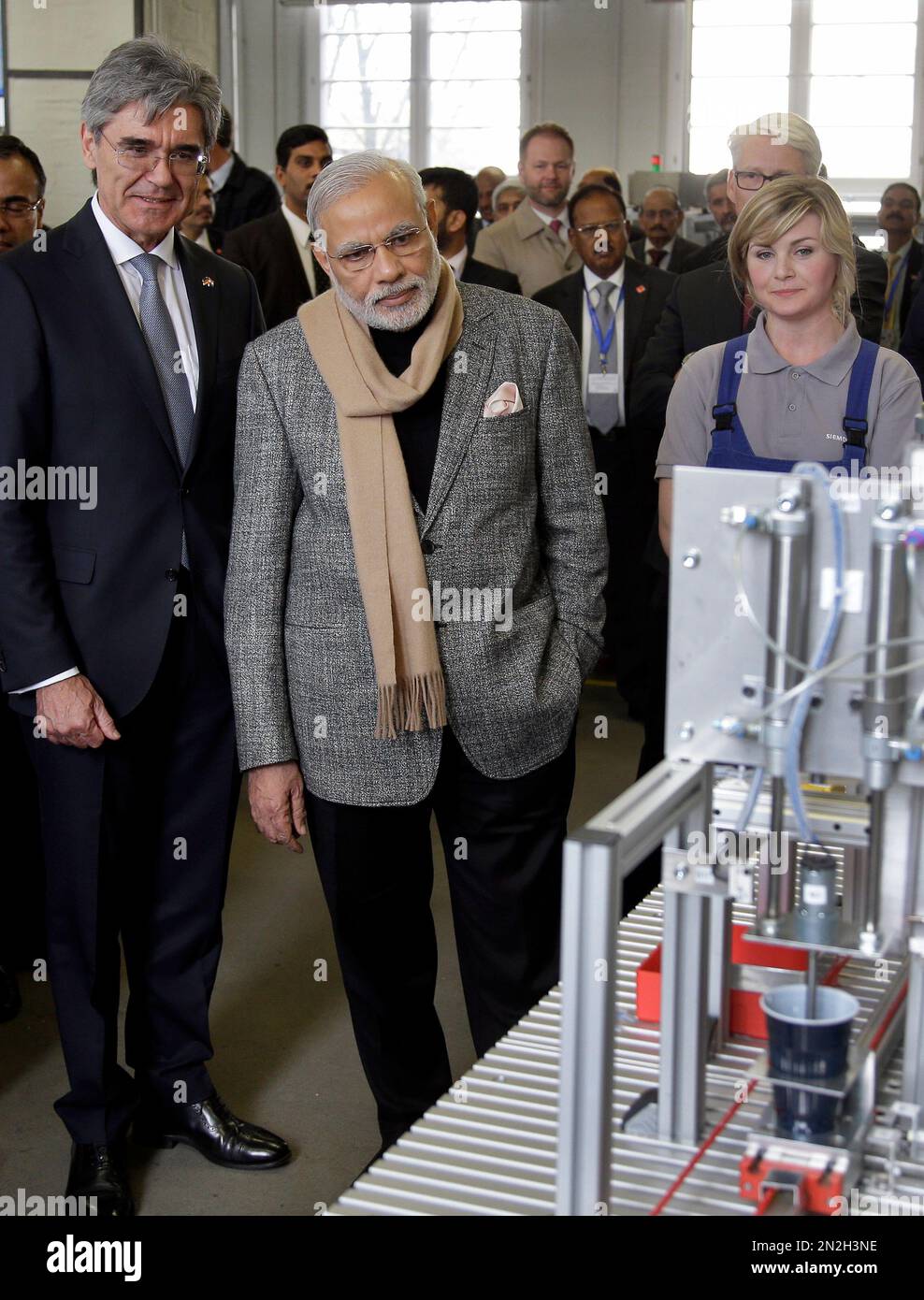 The Prime Minister of India, Narendra Modi, center, and Siemens CEO Joe ...