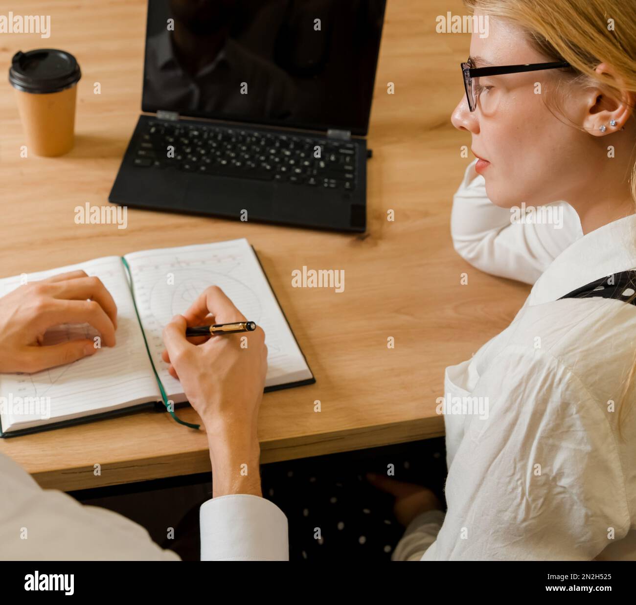 Professional supervisor explaining project two hi-res stock photography ...