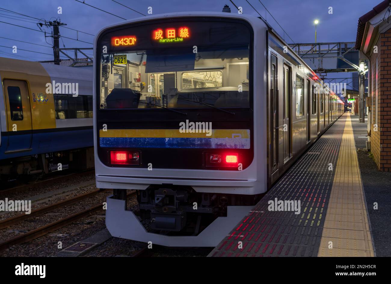 A JR East 209-2100 Series train on the Narita Line at Choshi Station in Chiba Prefecture, Japan ...